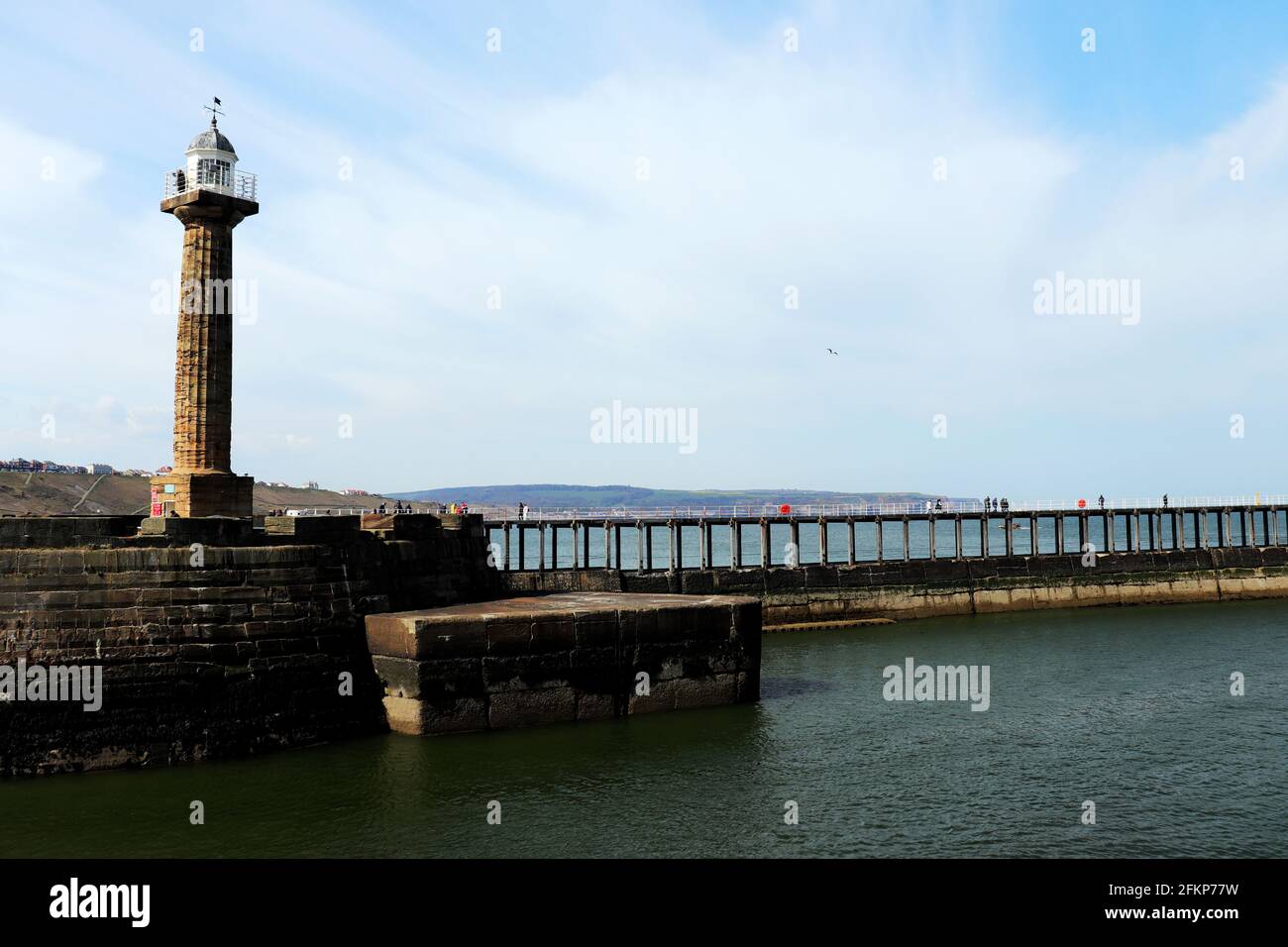 Whitby Lighthouse and Pier Stock Photo - Alamy