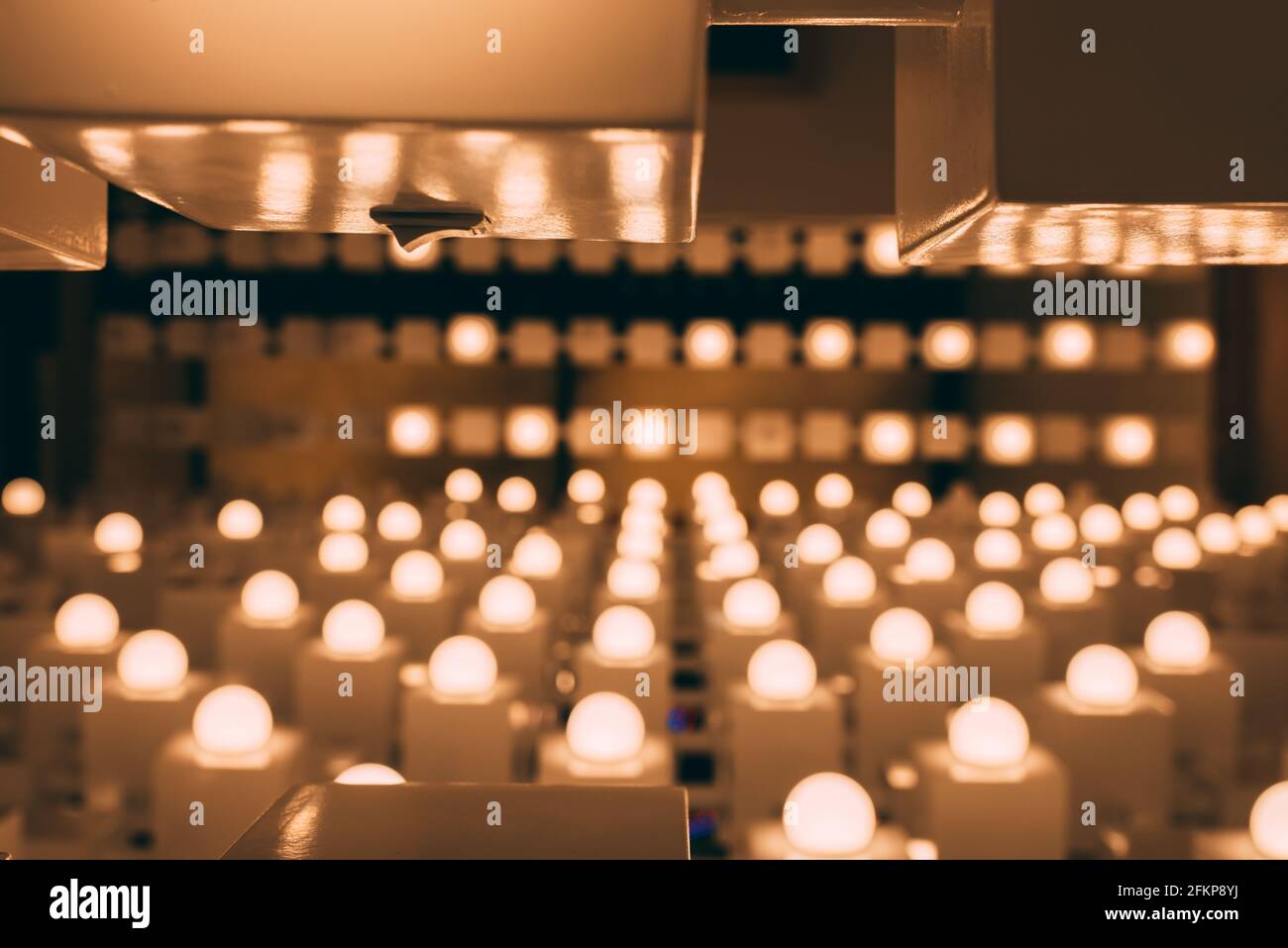 Blurred background of small lightning bulbs Stock Photo - Alamy