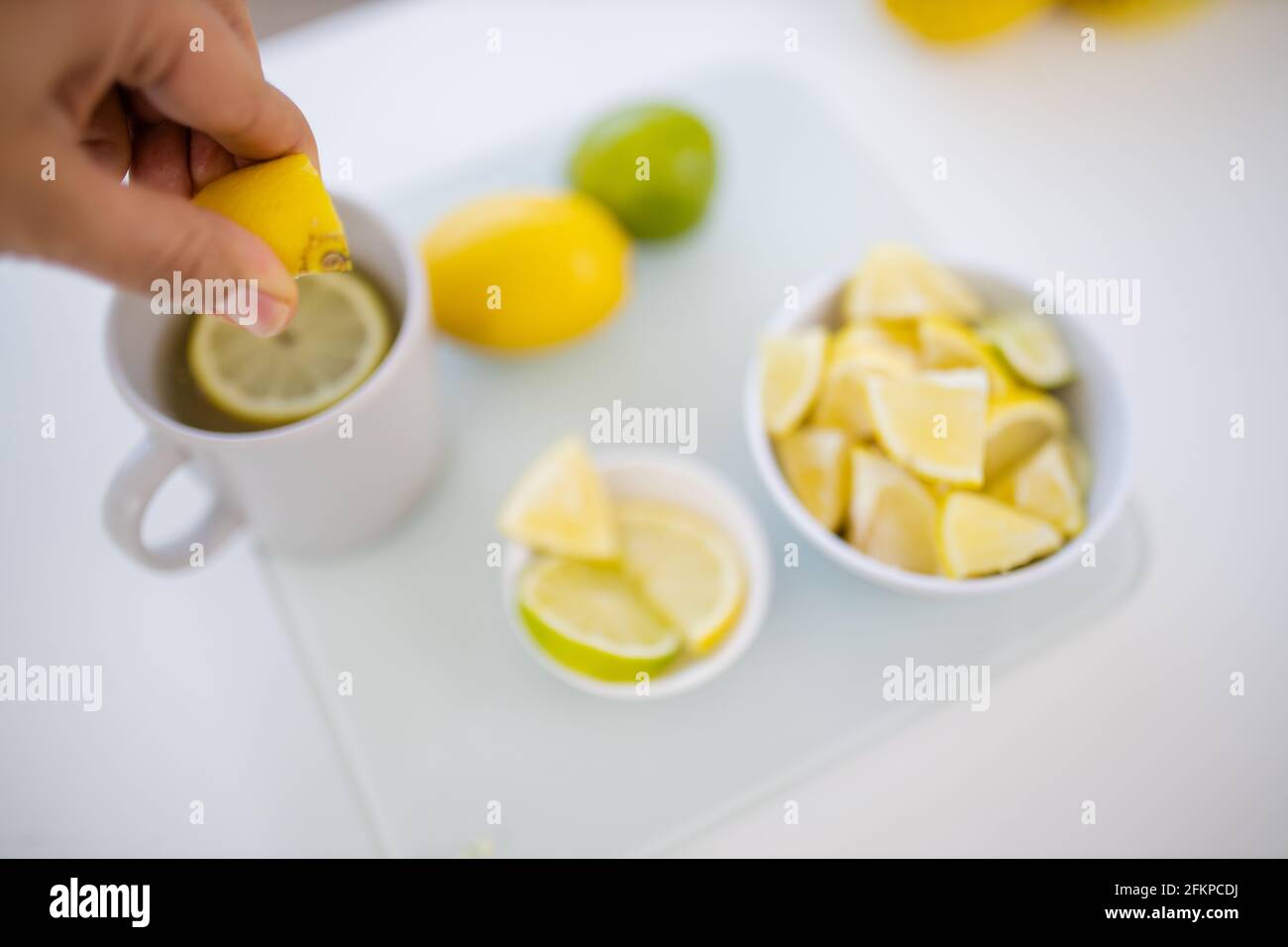 Squeezing fresh lemon juice top hi-res stock photography and images - Alamy