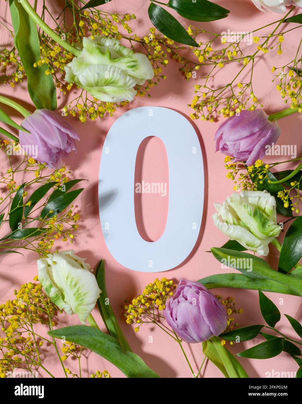 Number zero on pink background with colorful flowers. Flat lay, top ...