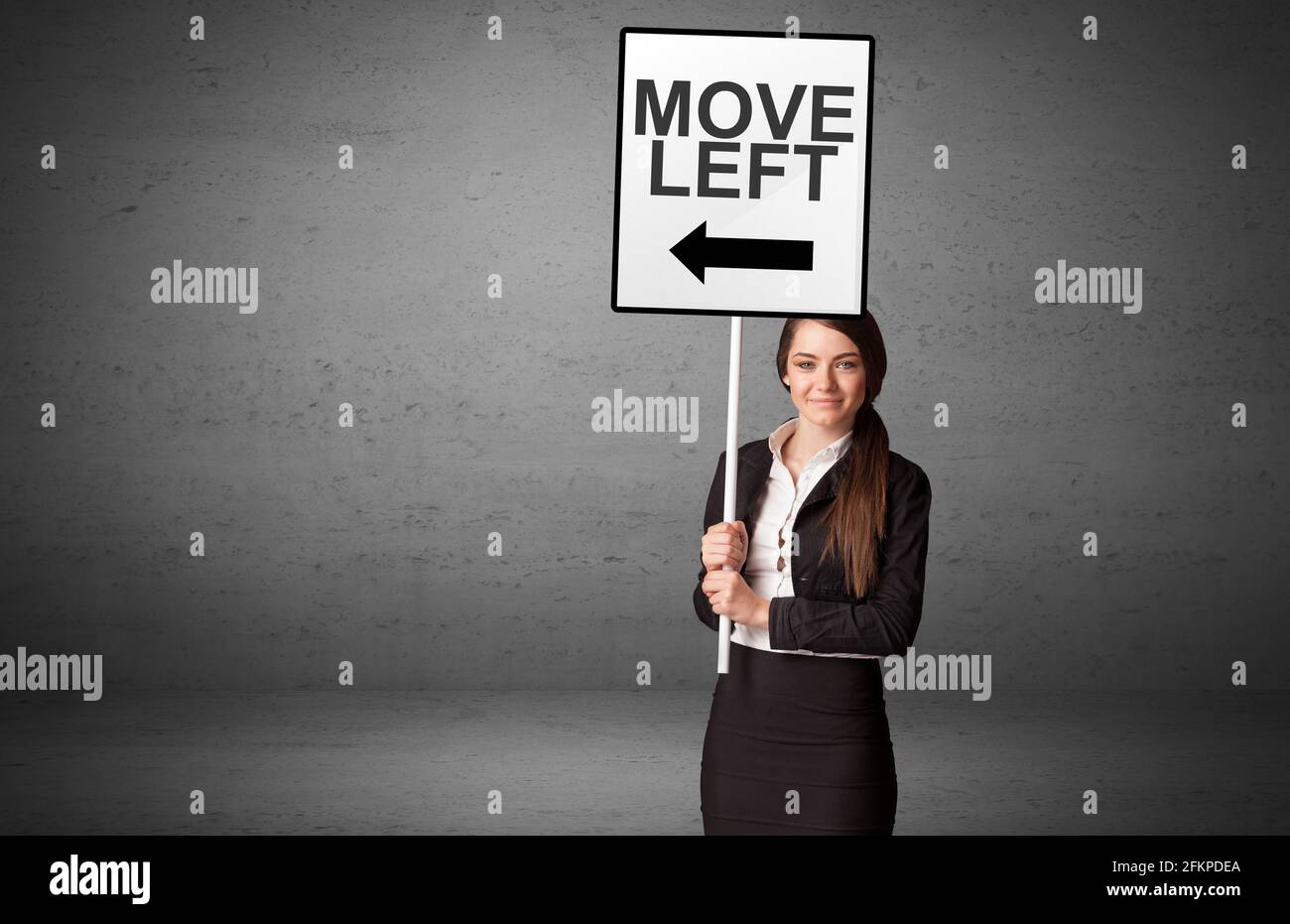 business person holding a traffic sign Stock Photo - Alamy