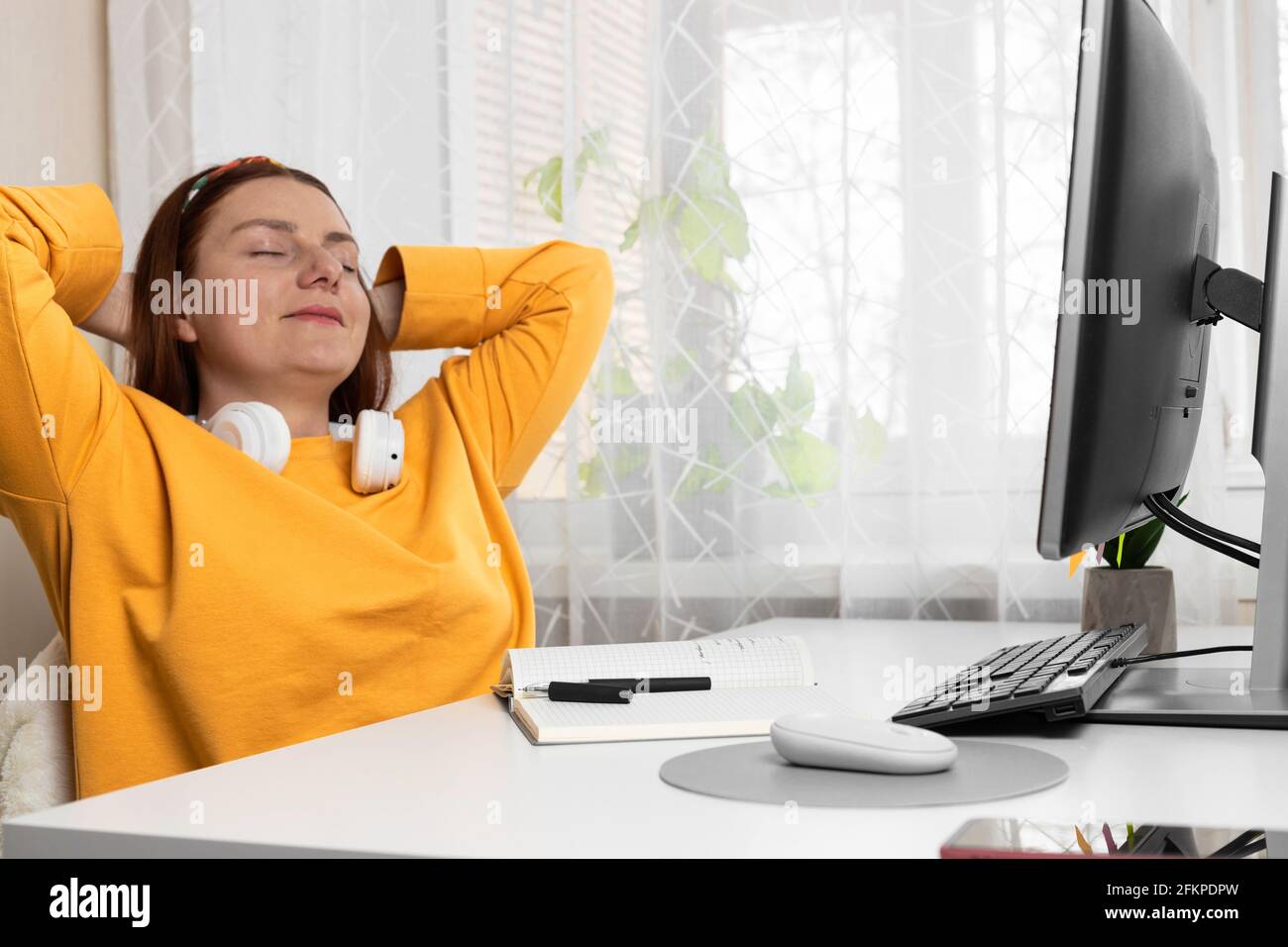 Happy student relaxing after long time of distant learning by PC at ...