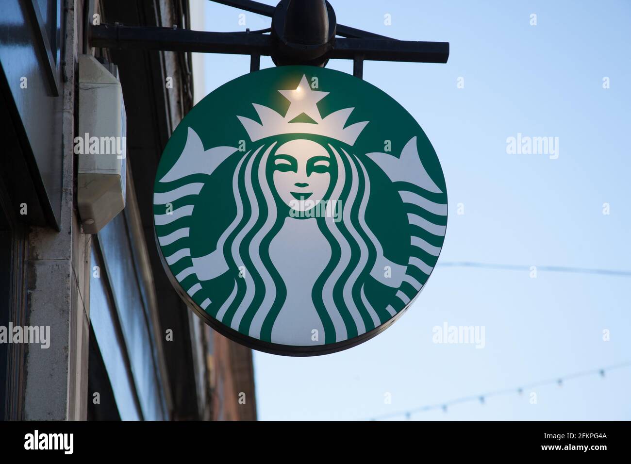 The Starbucks cafe sign hanging outside a cafe in Henley in Oxfordshire ...