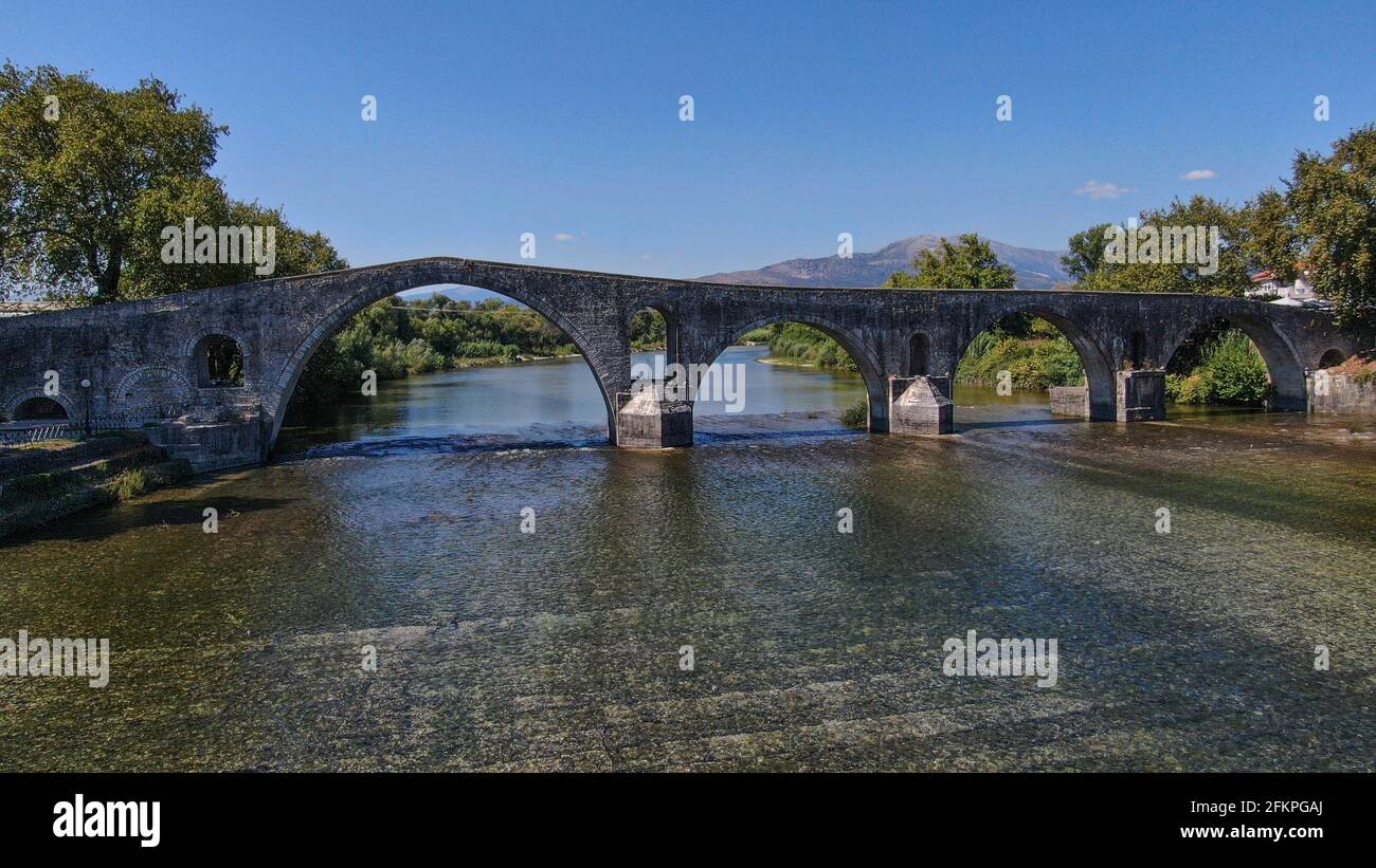 Old stone bridge of Arta, Arachthos river, aerial drone view, Epirus ...