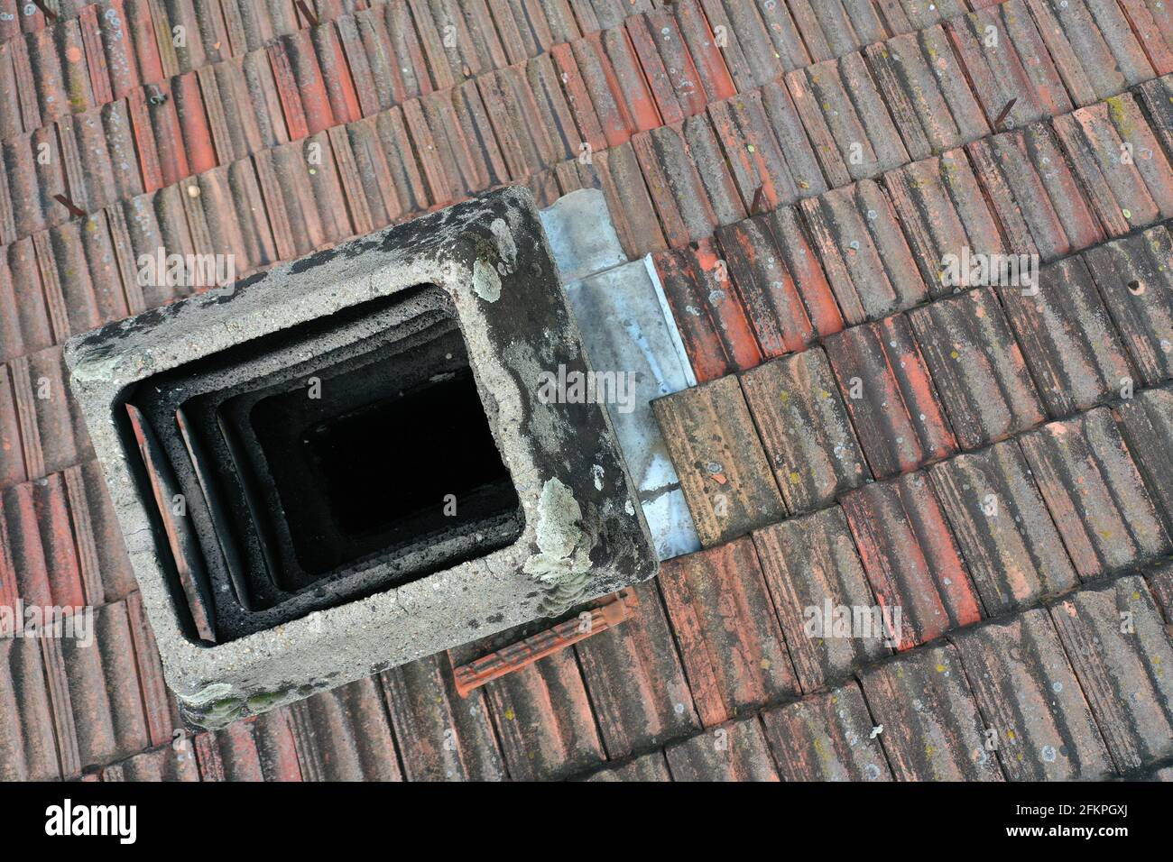 italiy tile roof chimney detail aerial drone view Stock Photo - Alamy