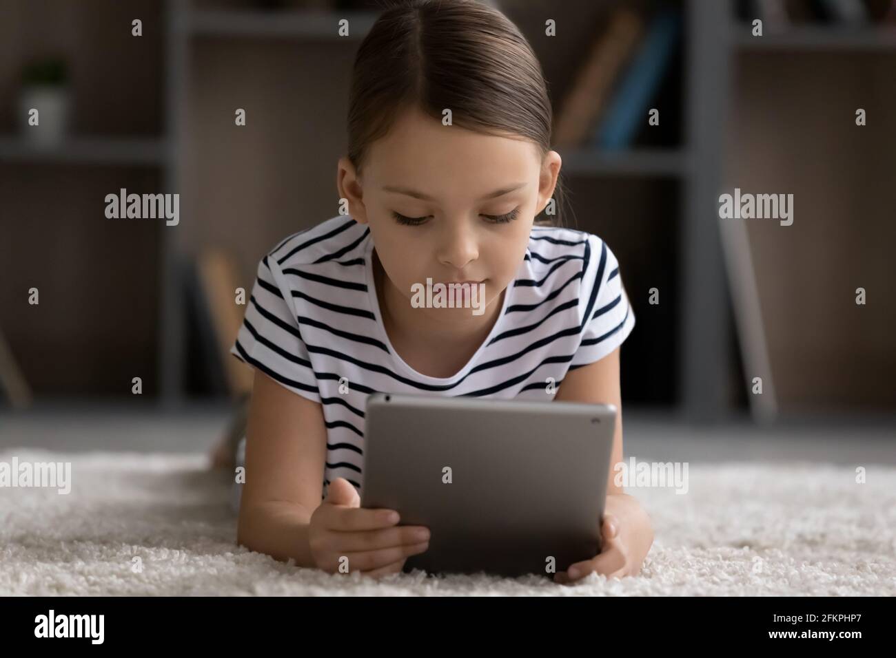 Child watching virtual screen hi-res stock photography and images - Alamy