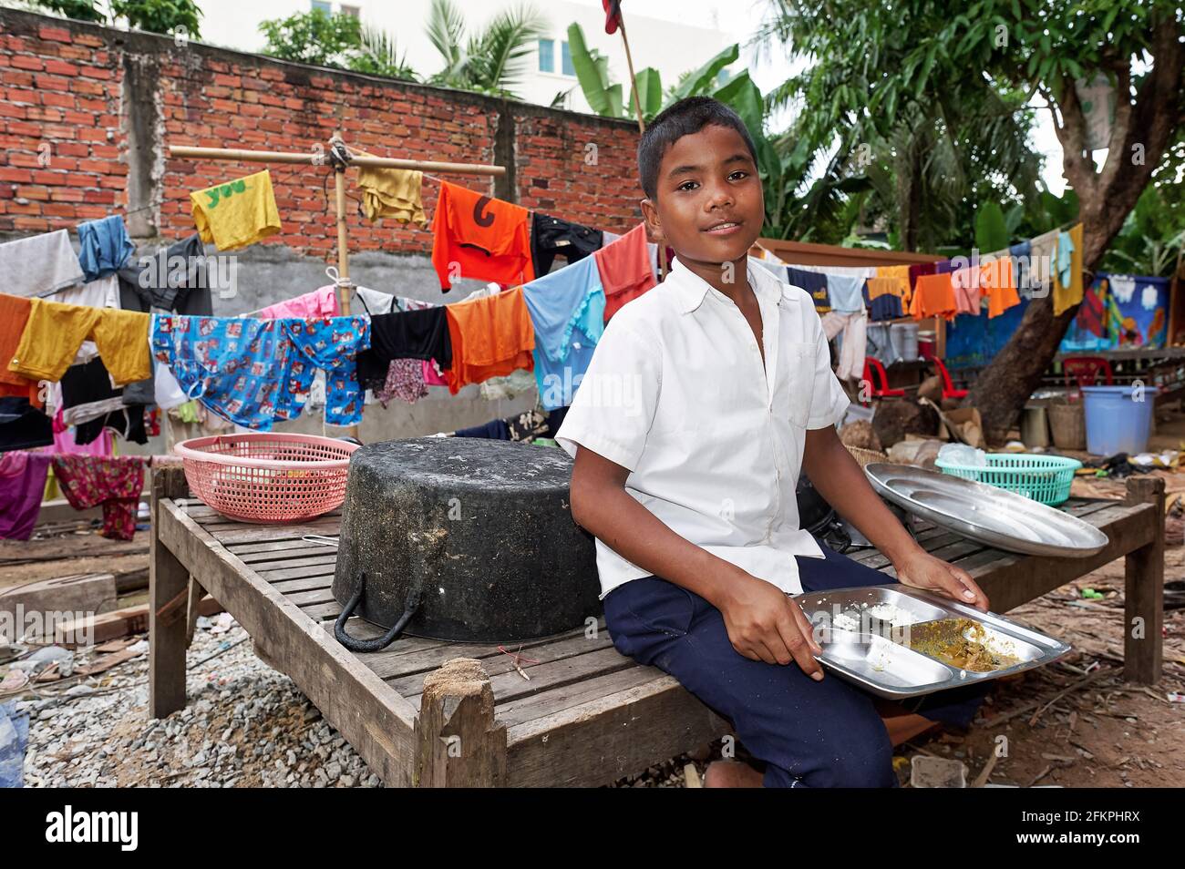 Children orphans in a orphanage of Siem Reap having lunch. Cambodia ...