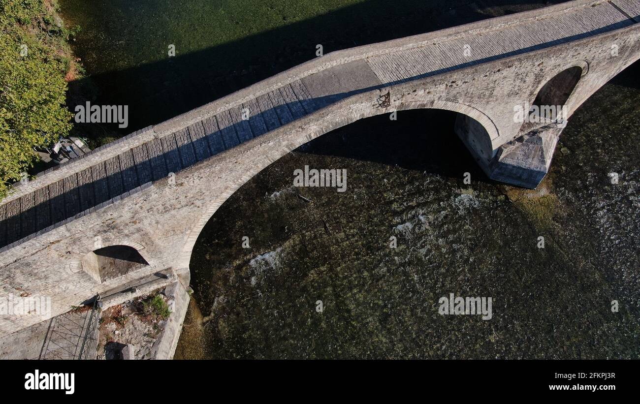 Old stone bridge of Arta, Arachthos river, aerial drone view, Epirus ...