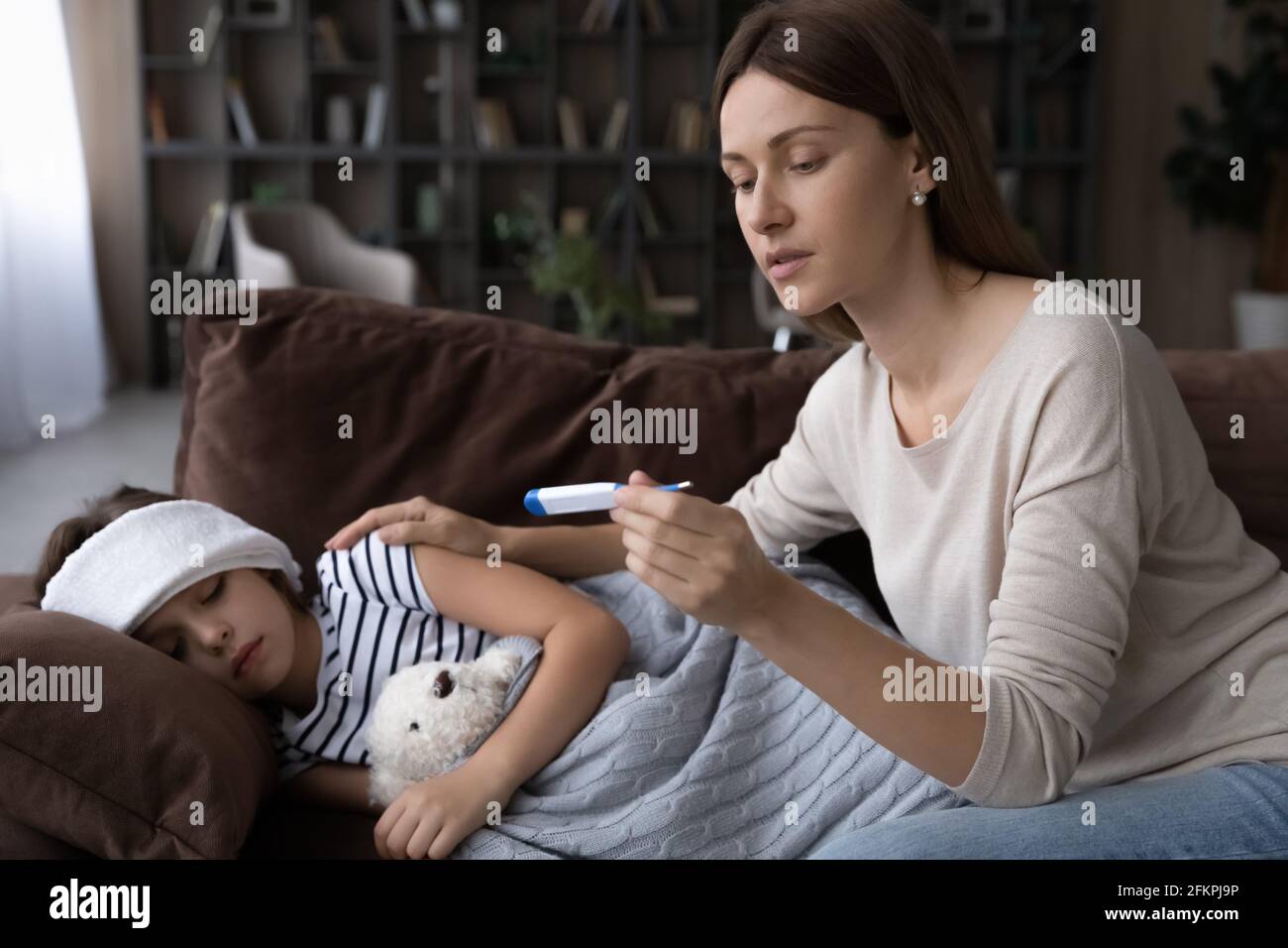 Worried mother sick child hi-res stock photography and images - Alamy