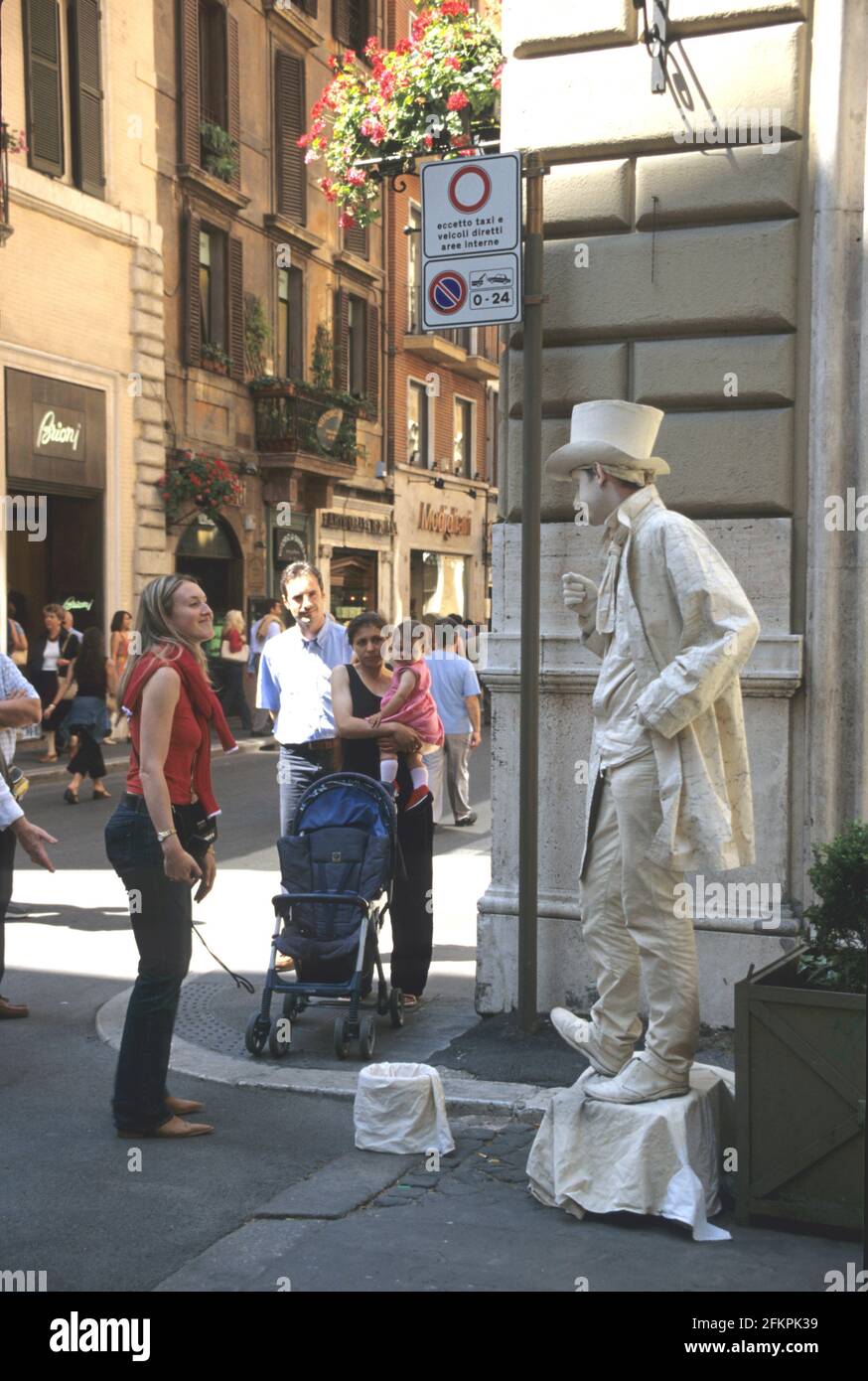 A human statue performs at the Piazza di Spagna, below the Spanish ...