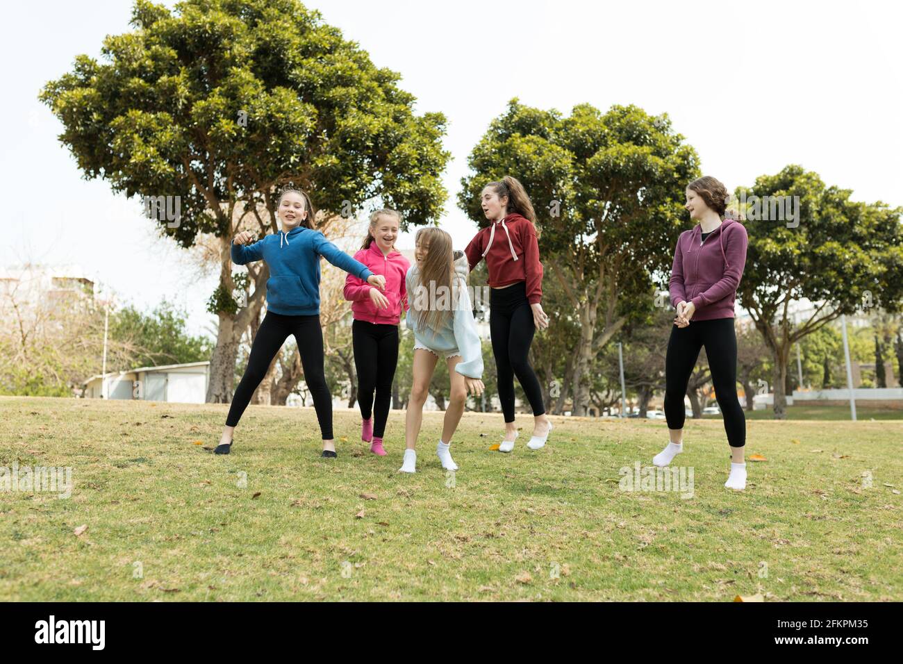 Group of five girls happy together Stock Photo - Alamy