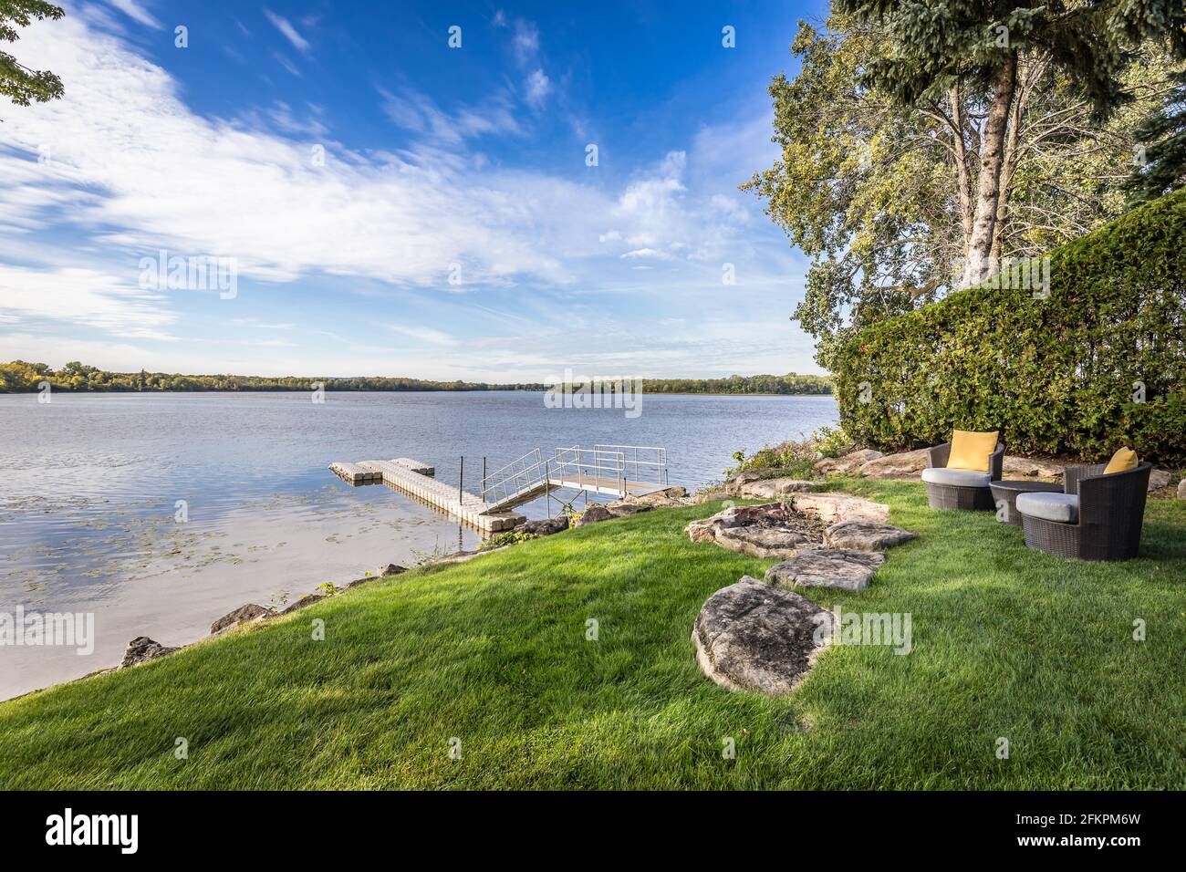 relaxing and seating by the water, waterfront Stock Photo - Alamy
