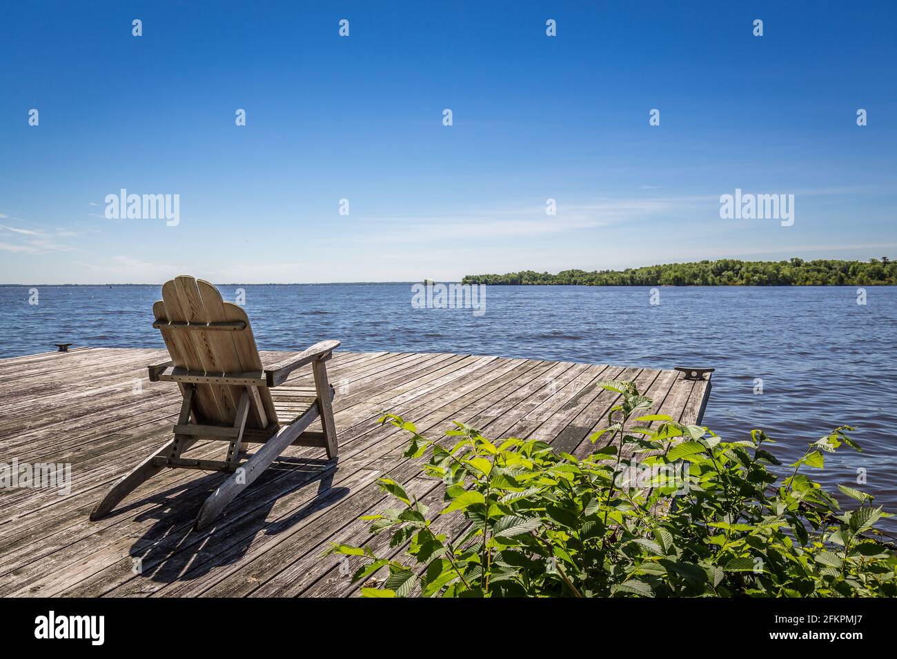 relaxing and seating by the water, waterfront Stock Photo - Alamy