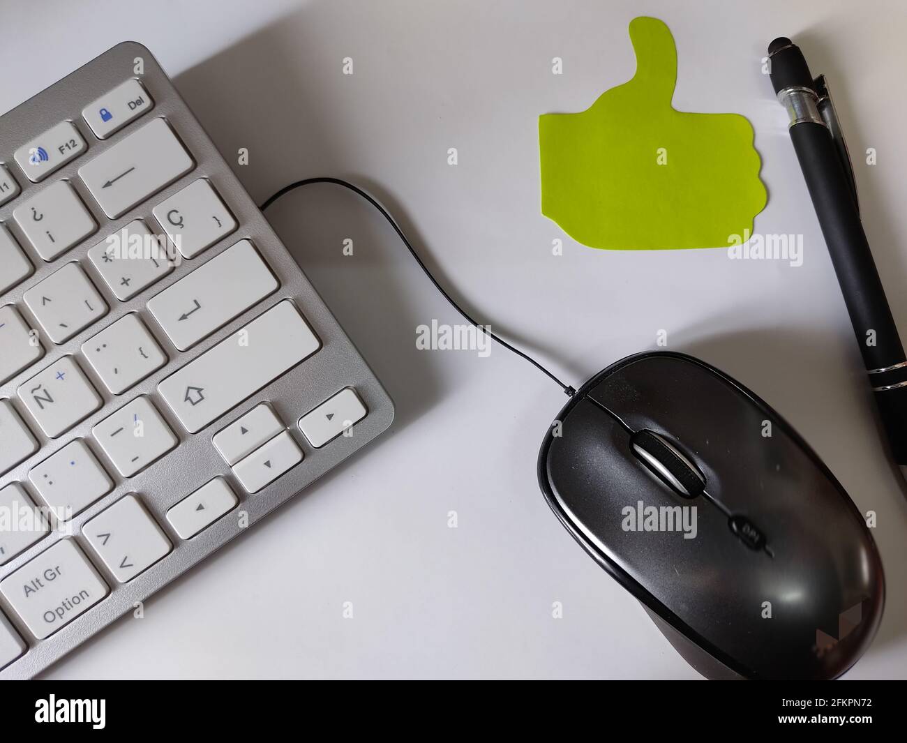 Overhead shot of an office desk corner with computer keyboard and mouse ...
