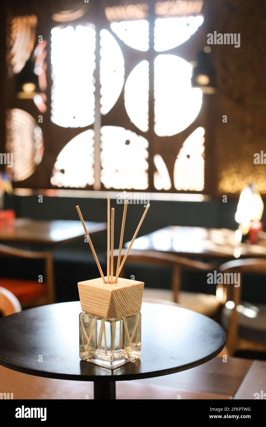 Aromatherapy reed diffuser air freshener on relaxed spa background ...