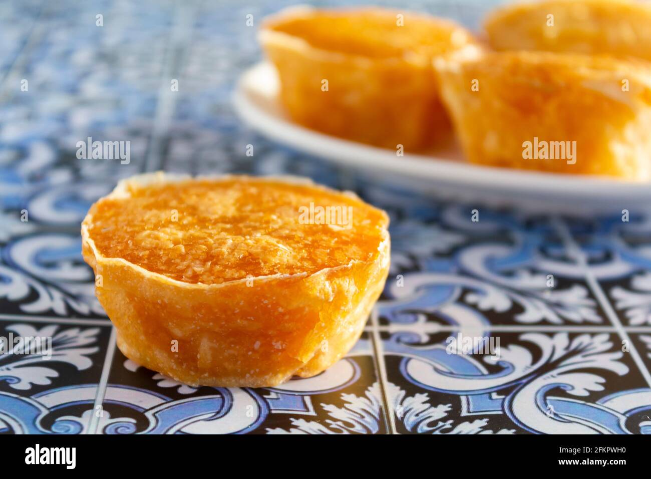Traditional portuguese sweet bean pastry called Pastel de Feijao on ...