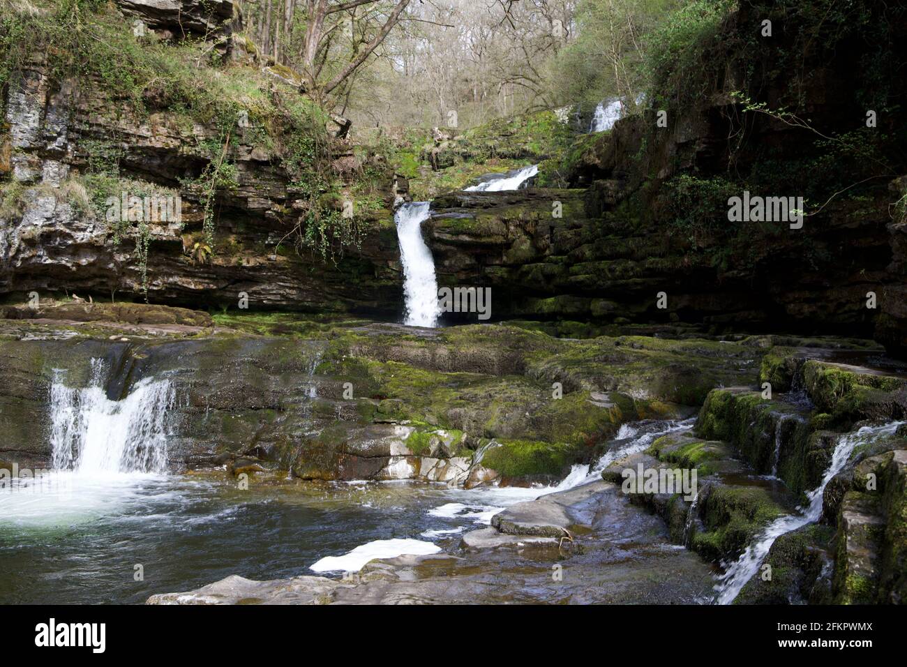 Three-tiered waterfall on the Four Falls Trail in Wales Stock Photo - Alamy