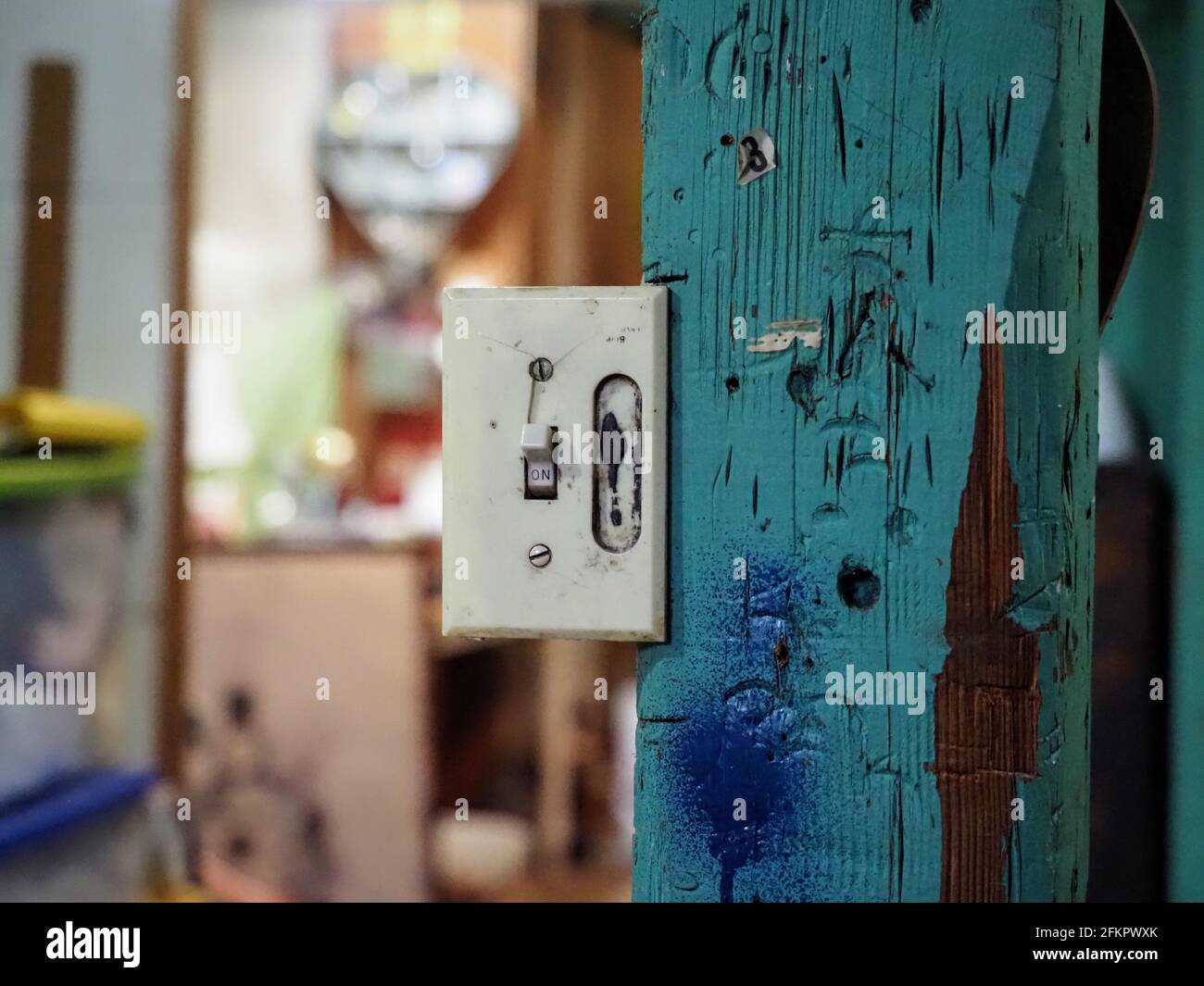 Selective focus of a light switch in a basement of an old house Stock ...