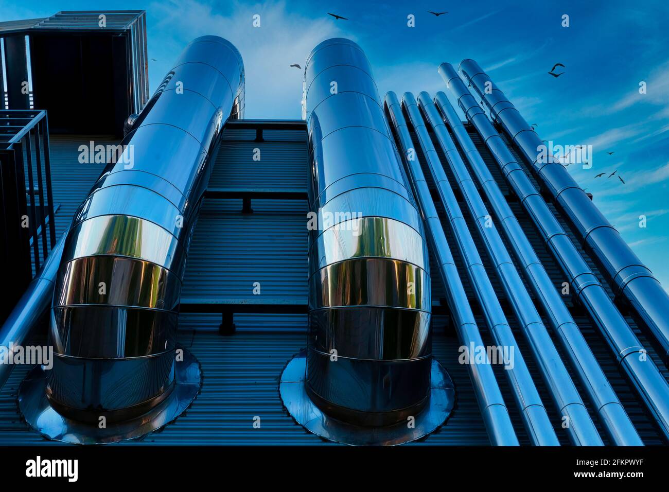 Aluminum pipes on the exterior of a building Stock Photo - Alamy