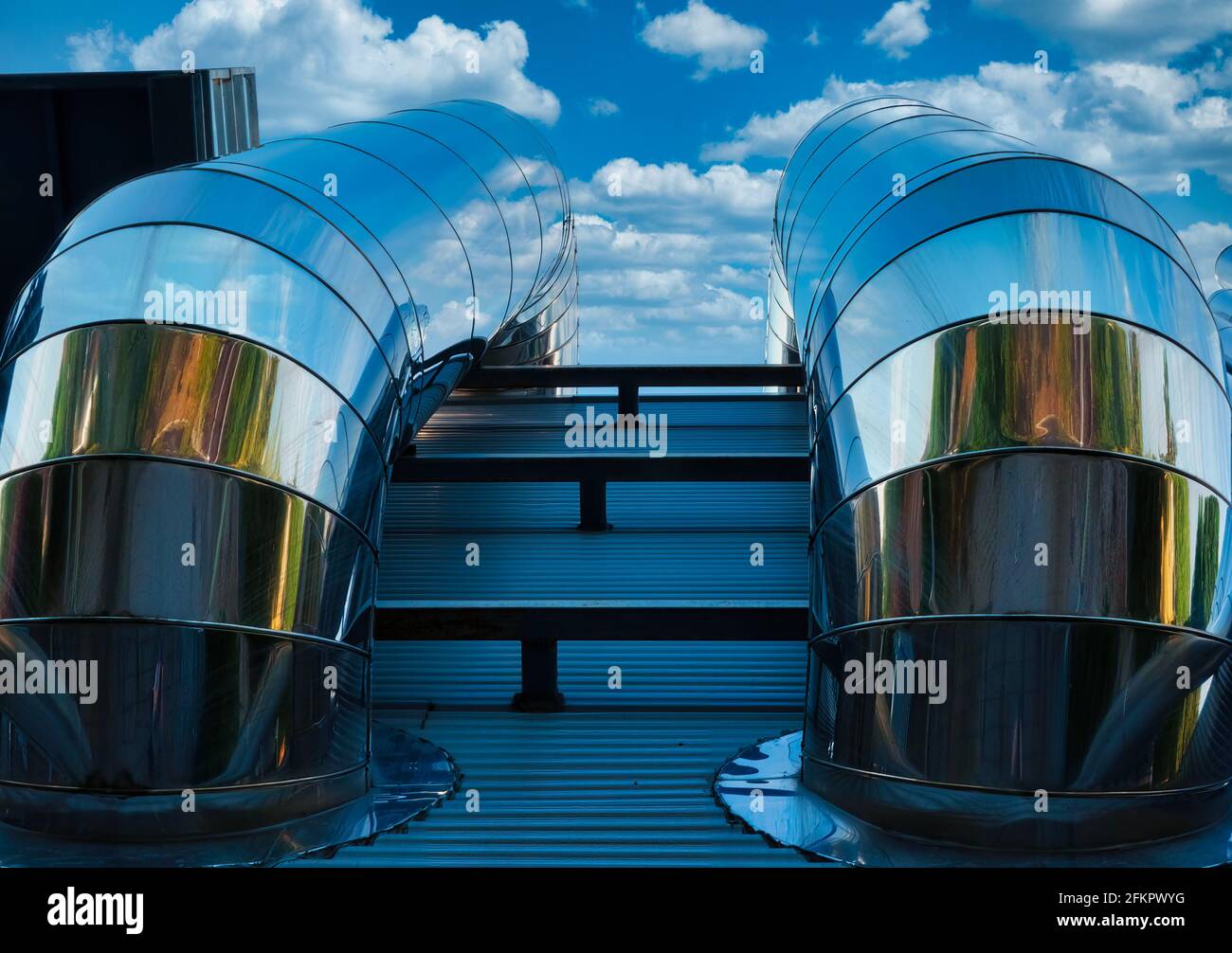 Aluminum pipes on the exterior of a building Stock Photo - Alamy