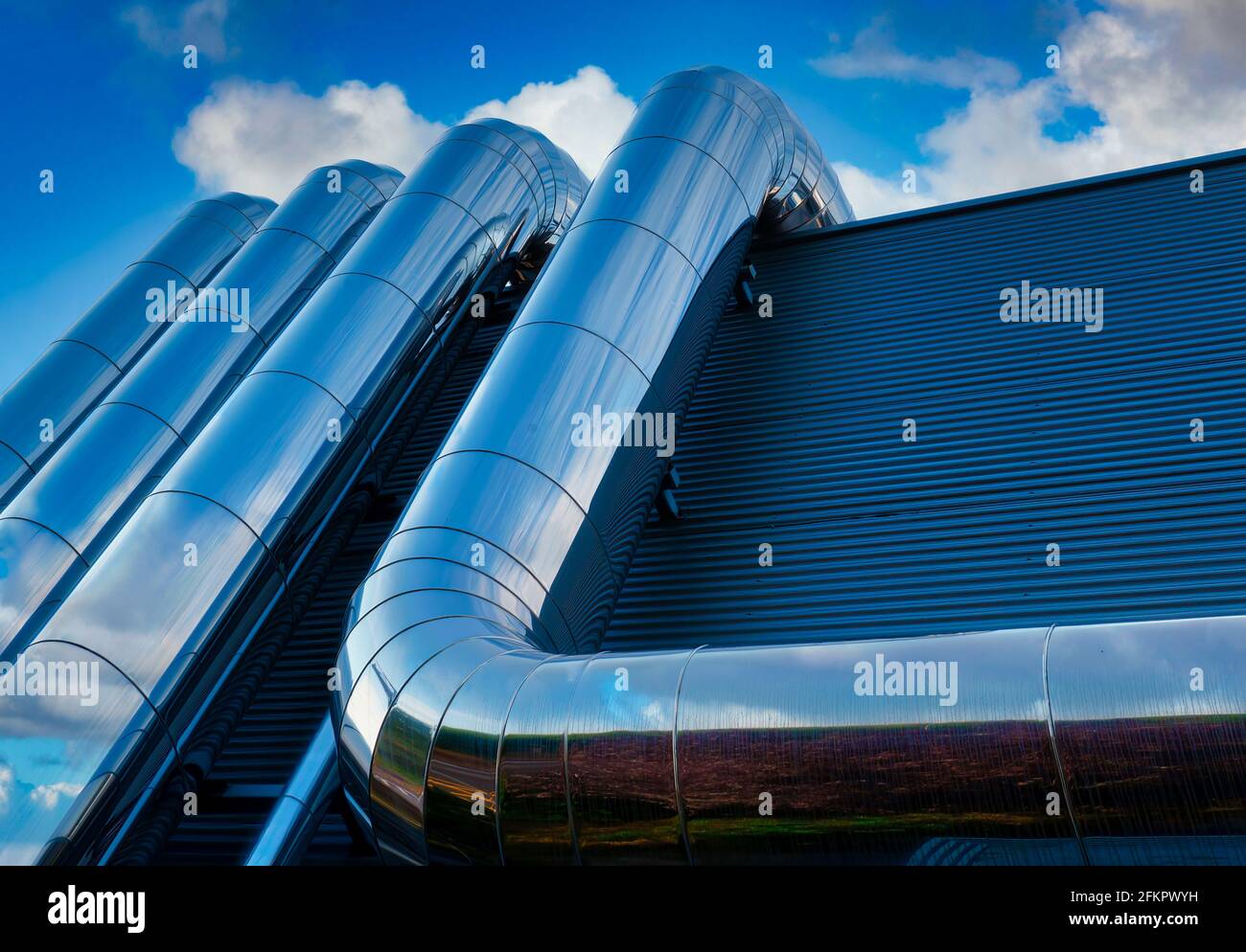 Aluminum pipes on the exterior of a building Stock Photo - Alamy