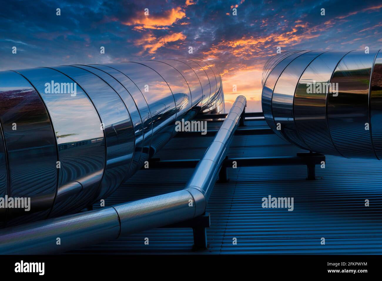 Aluminum pipes on the exterior of a building Stock Photo - Alamy