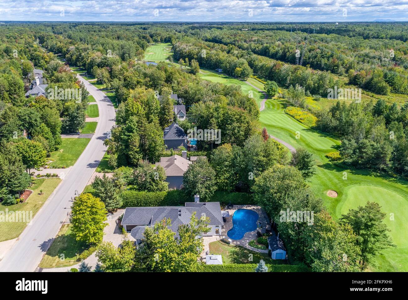 houses and gold course Stock Photo - Alamy