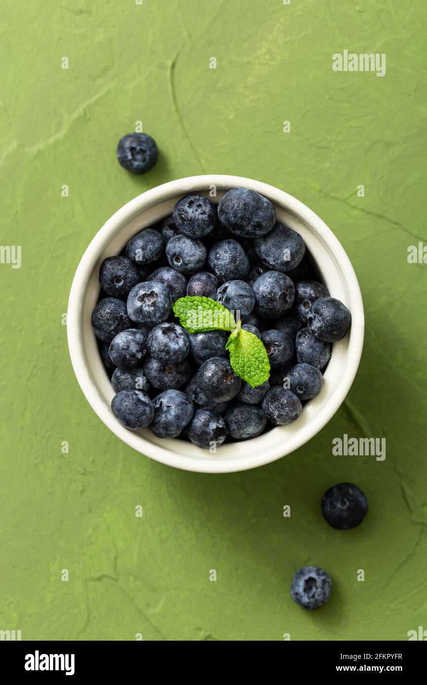 Vertical shot of commercial food photography with blueberries in white ...
