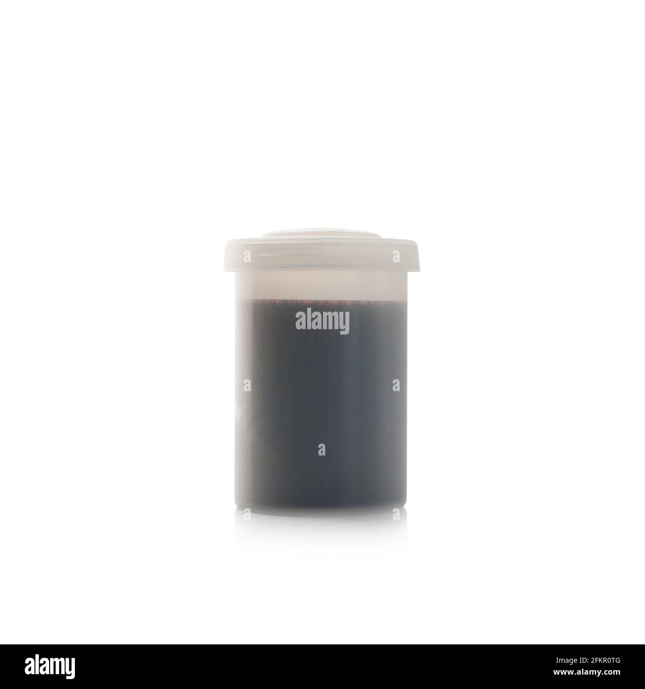 Plastic canister for a film 35mm roll isolated on white background ...
