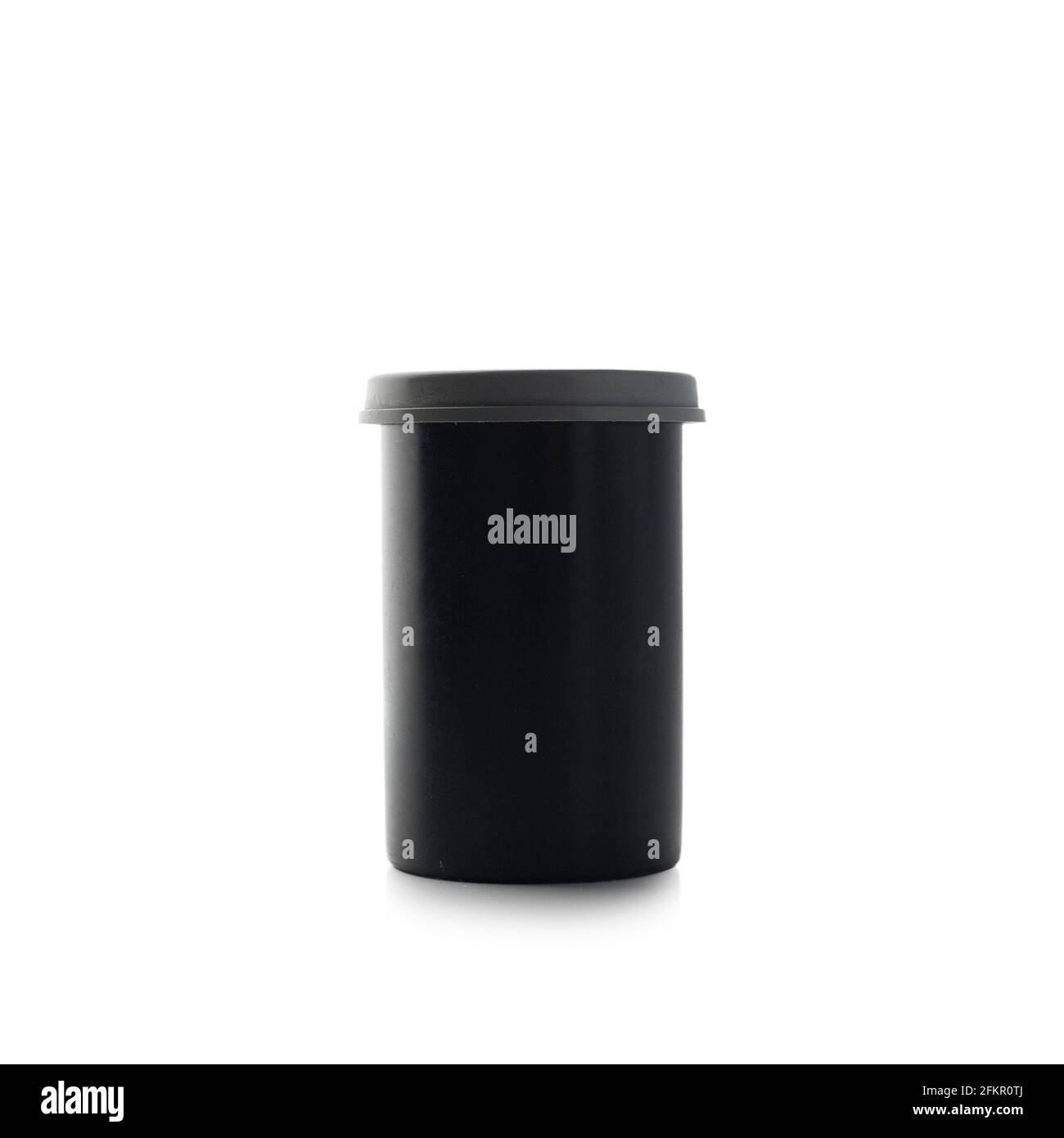 Plastic canister for a film 35mm roll isolated on white background ...