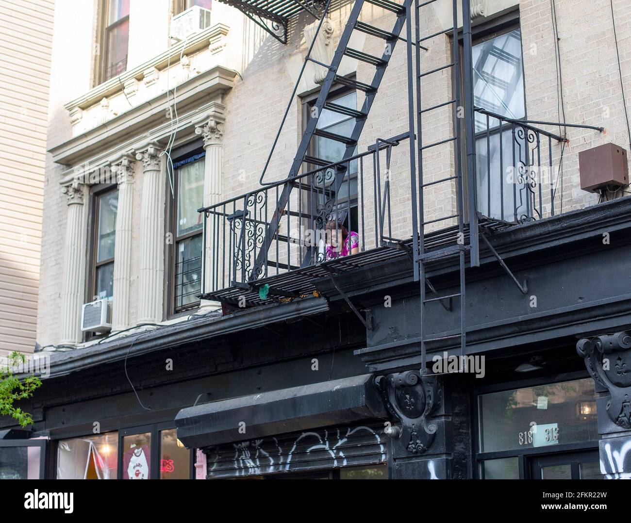Women looking out an apartment window in Brooklyn, NY Stock Photo - Alamy