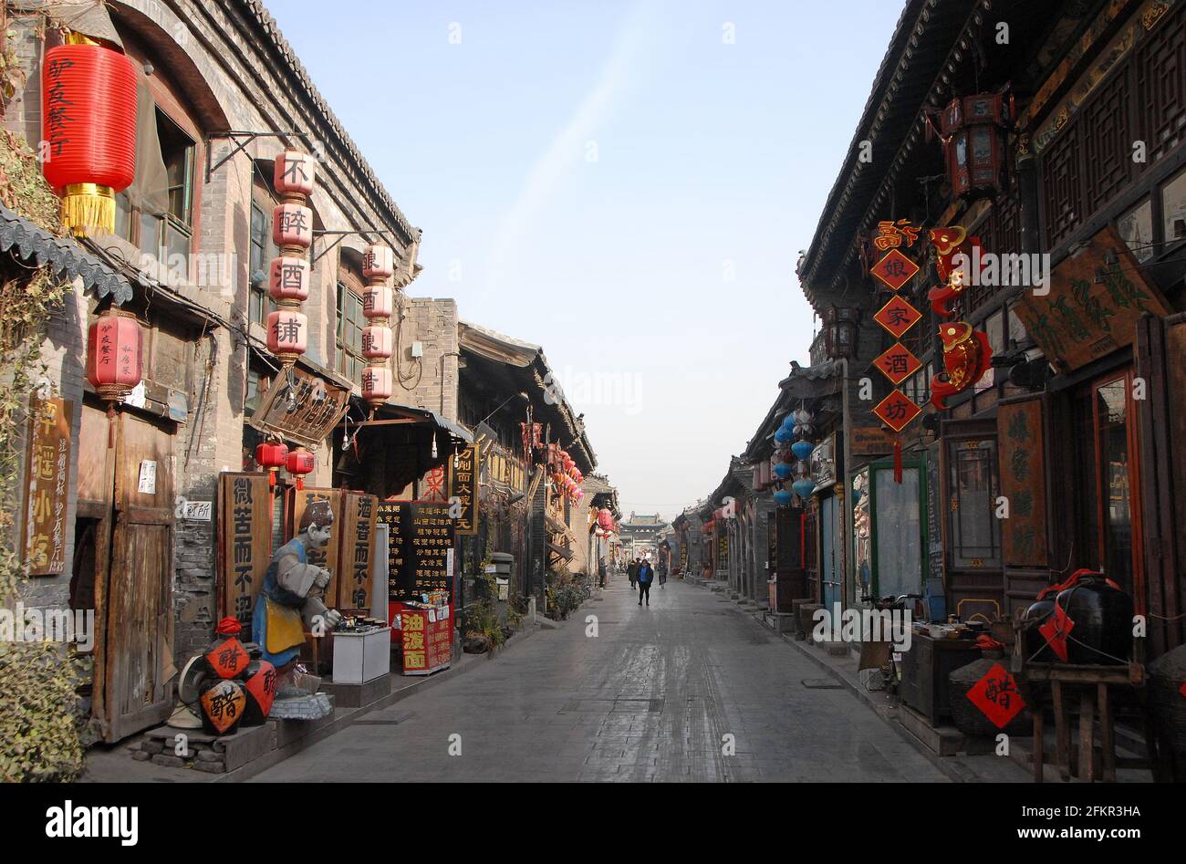 Pingyao in Shanxi Province, China: A road in Pingyao with cafes ...