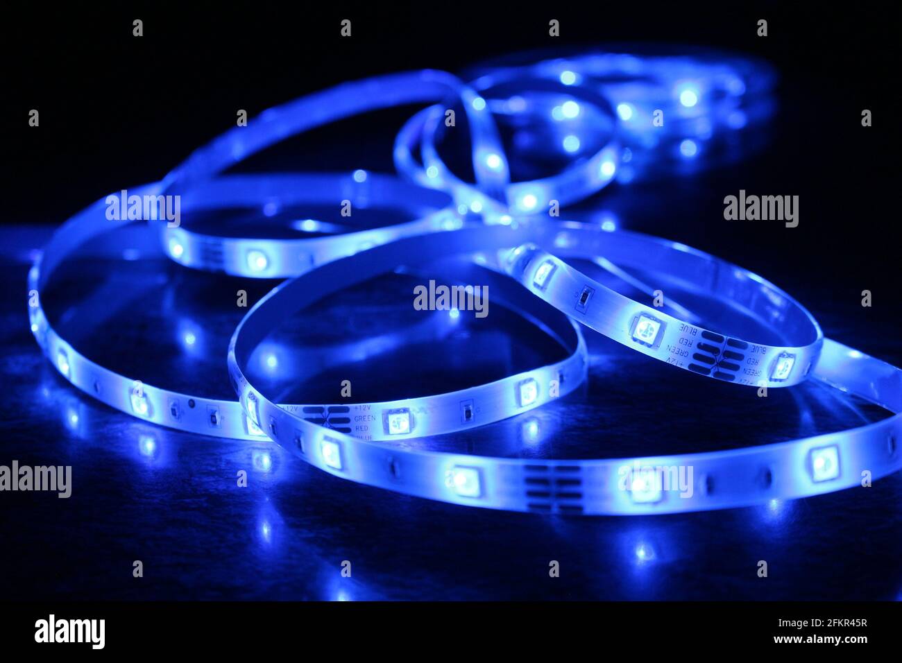 Led strip in operation generating suggestive luminous and colored ...