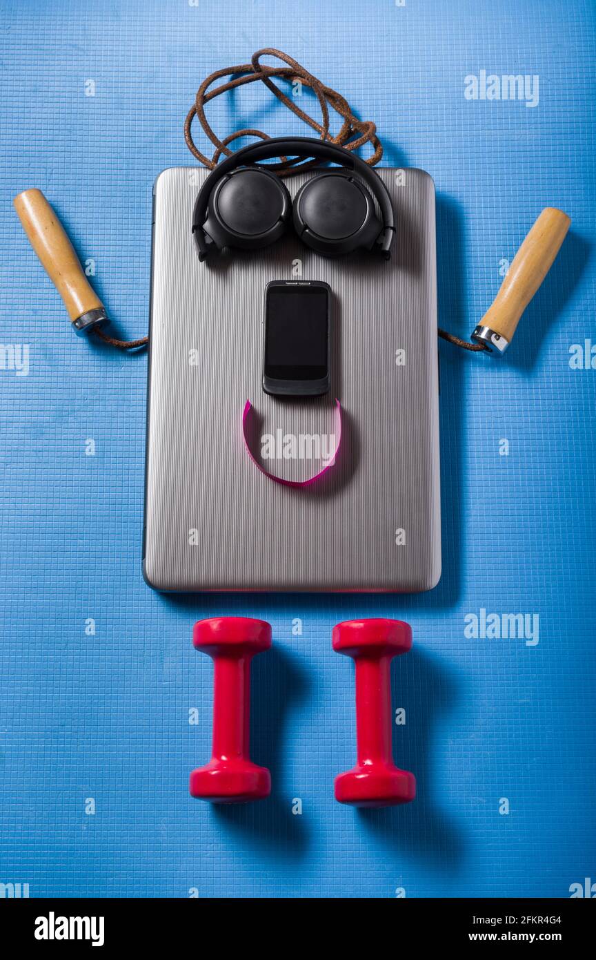 A positive person from objects. A man made of sports and electronic ...