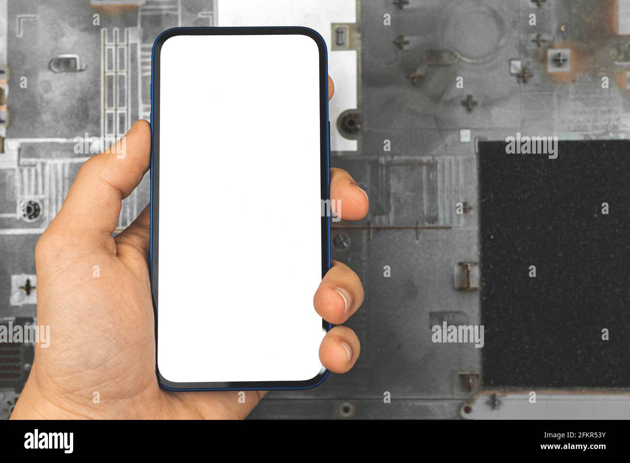 Mockup mobile phone on a background of computer and parts, repair ...