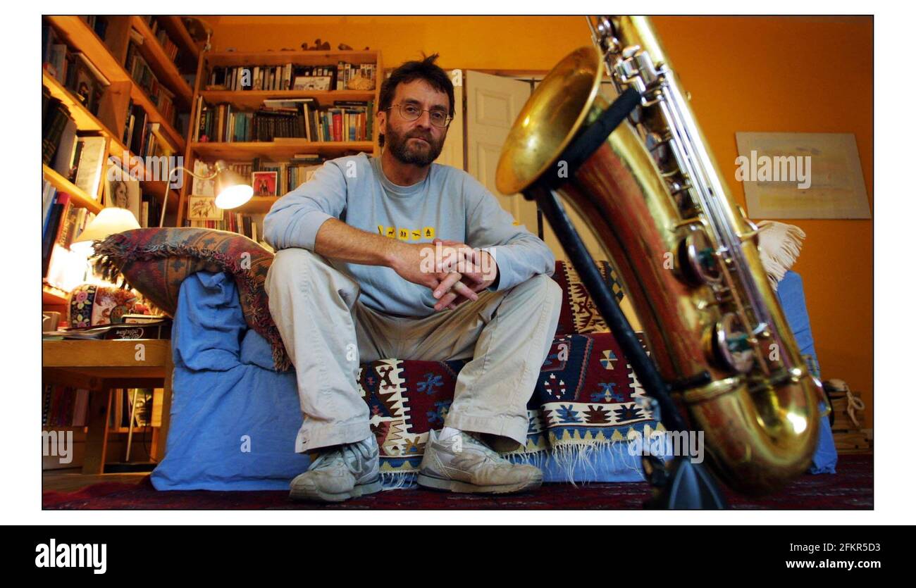 Tim Whitehead plays the sax at his home in Ham, Richmond.pic David ...