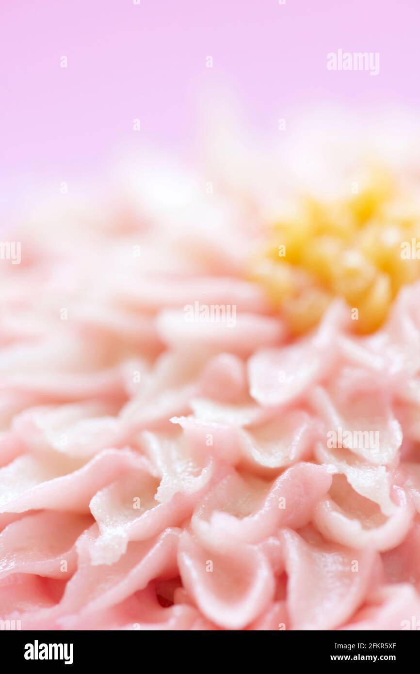 pretty pink icing background an abstract shot in a shallow deoth of ...