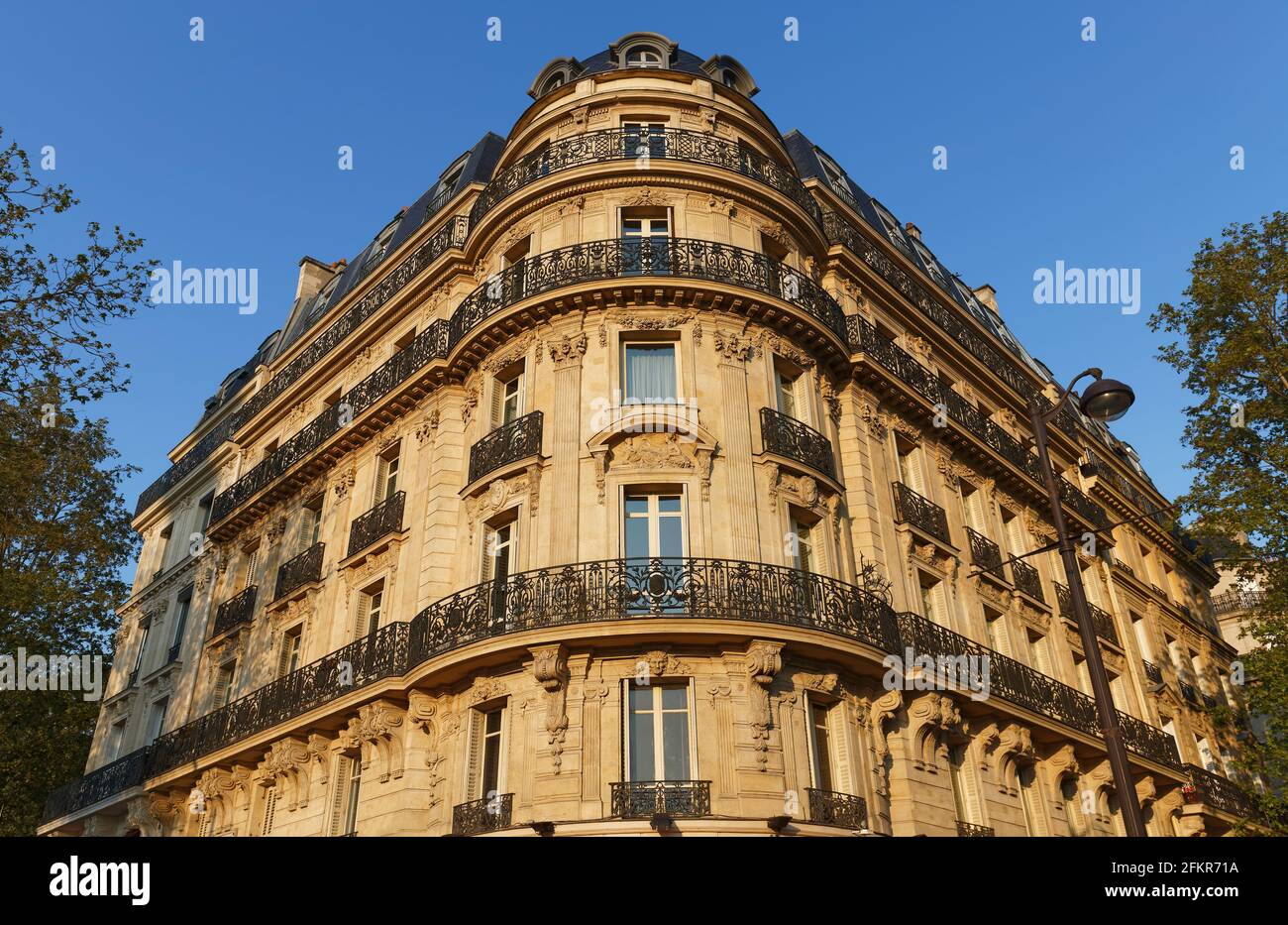Traditional French house with typical balconies and windows. Paris ...