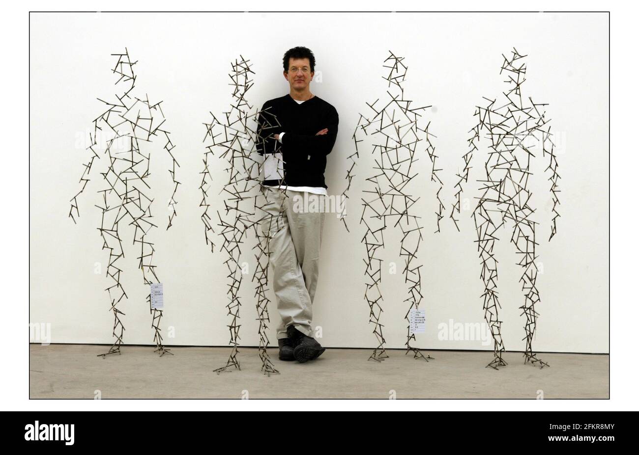 Anthony Gormley in his studio in north London......with Hugh Brody who ...