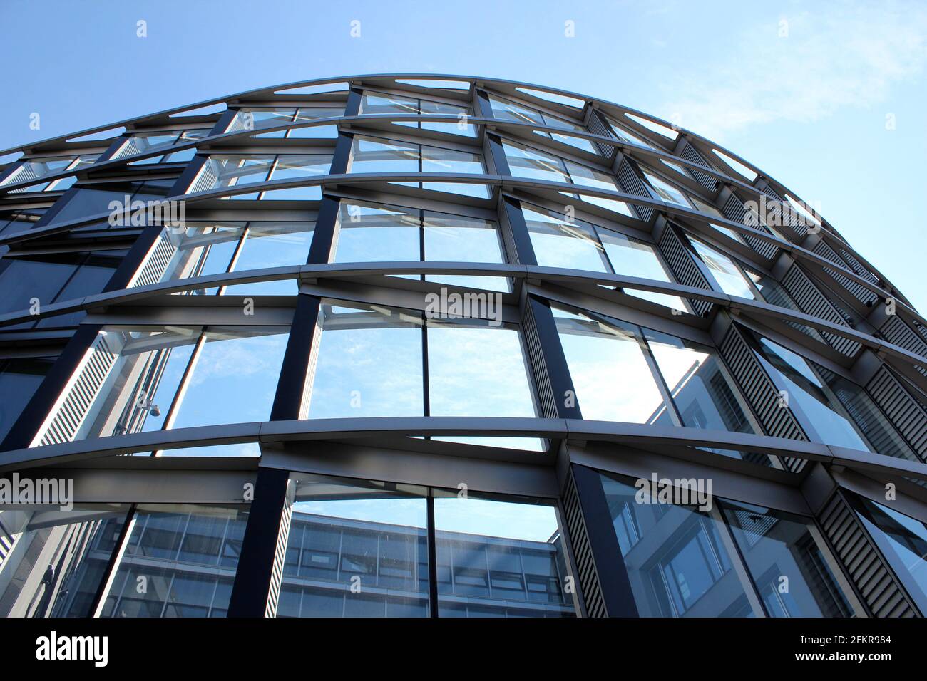 Curved exterior metal and glass screen building in Munich, Germany ...