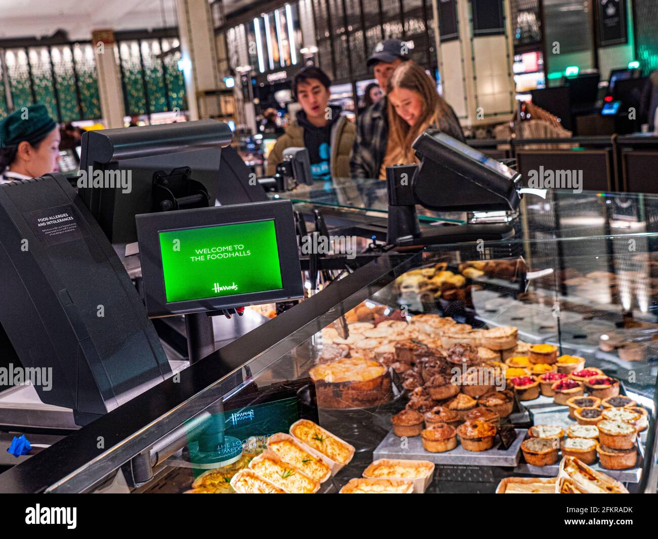 Harrods Food Hall interior with variety of pies and savouries on ...