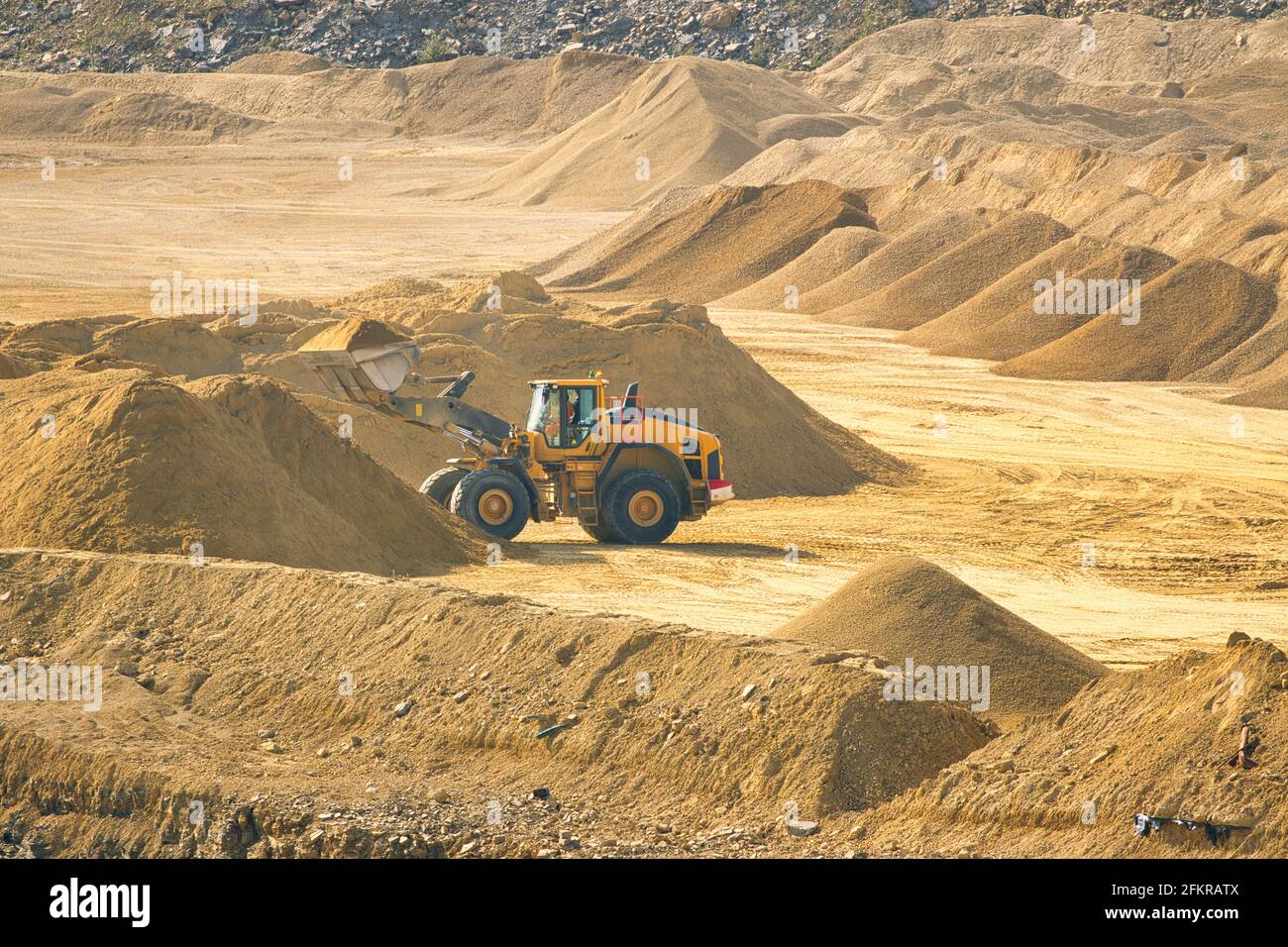 A Large Wheel Loader working in a Huge Quarry. England, UK Stock Photo ...