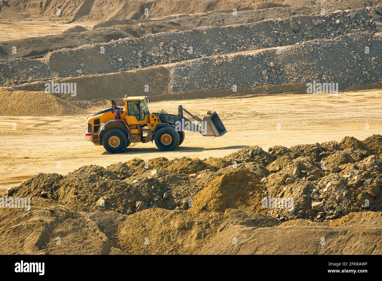 A Large Wheel Loader working in a Huge Quarry. England, UK Stock Photo ...