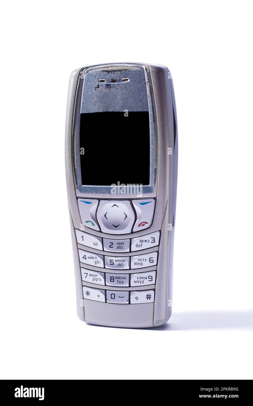 Old mobile push-button telephone. Personal phone with a small screen ...