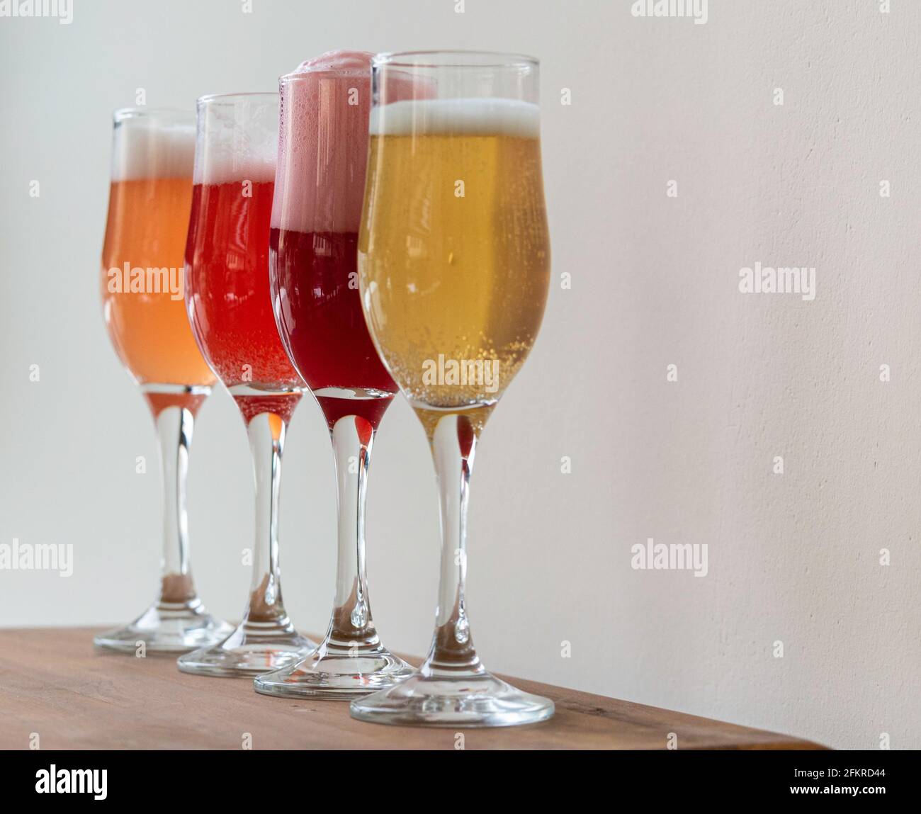 A glass of delicious craft beer served on an authentic beer glass, to ...