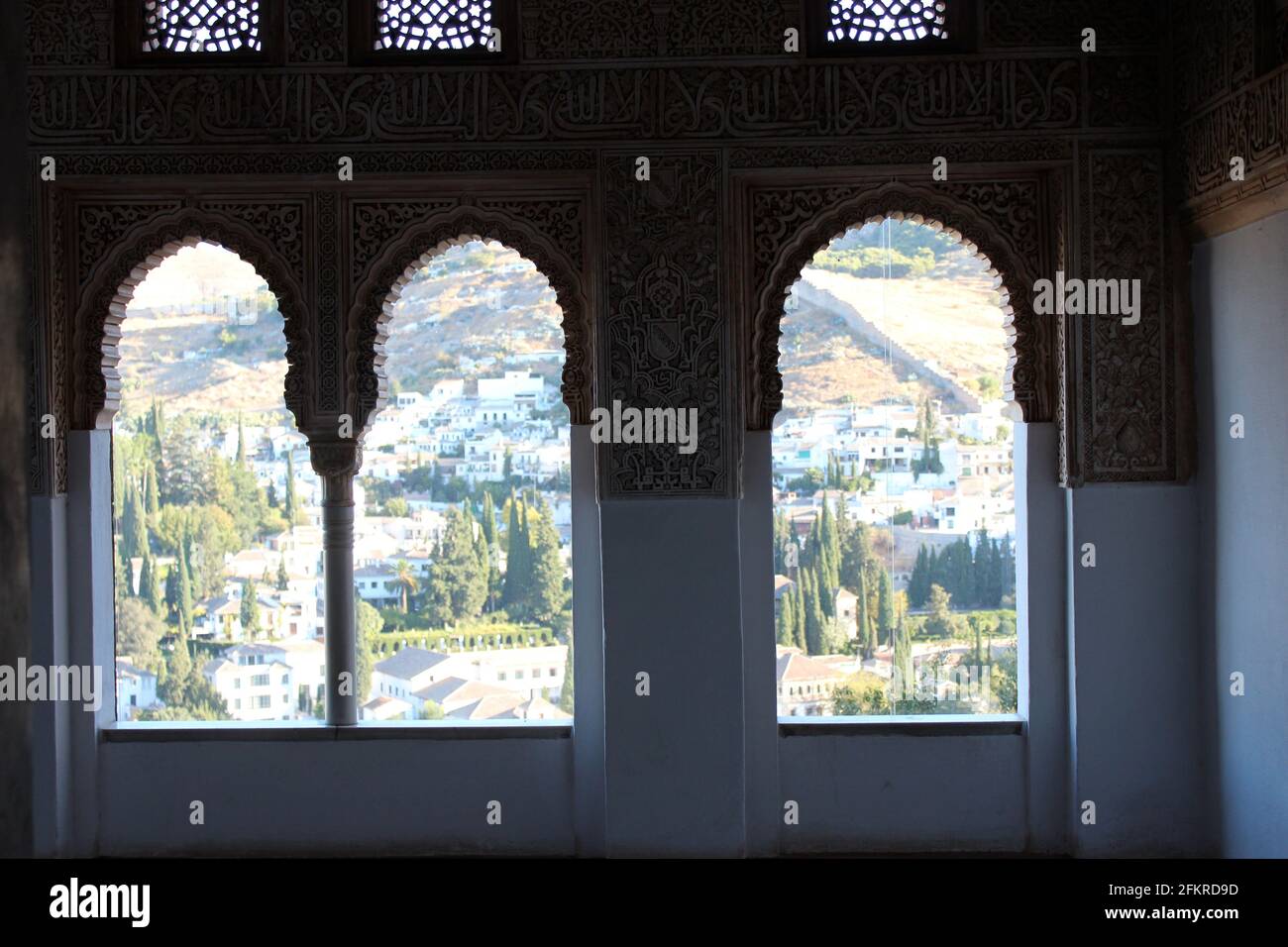 View to Granada from stone carved archway portals, moorish, Islamic ...