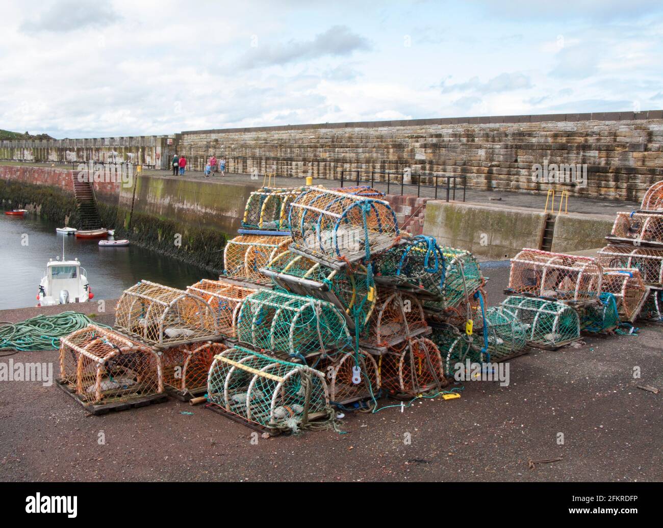 Creels stacked on the harbour, Dunbar, Scotland, UK Stock Photo - Alamy