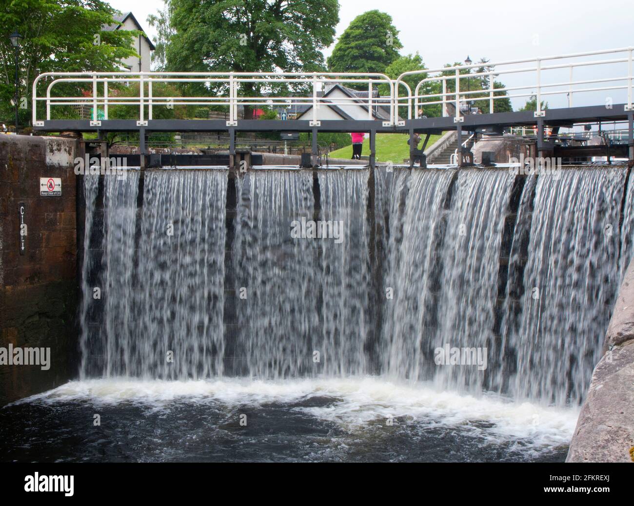 Water flowing over lock gates on the Caledonian Canal. Fort Augustus ...