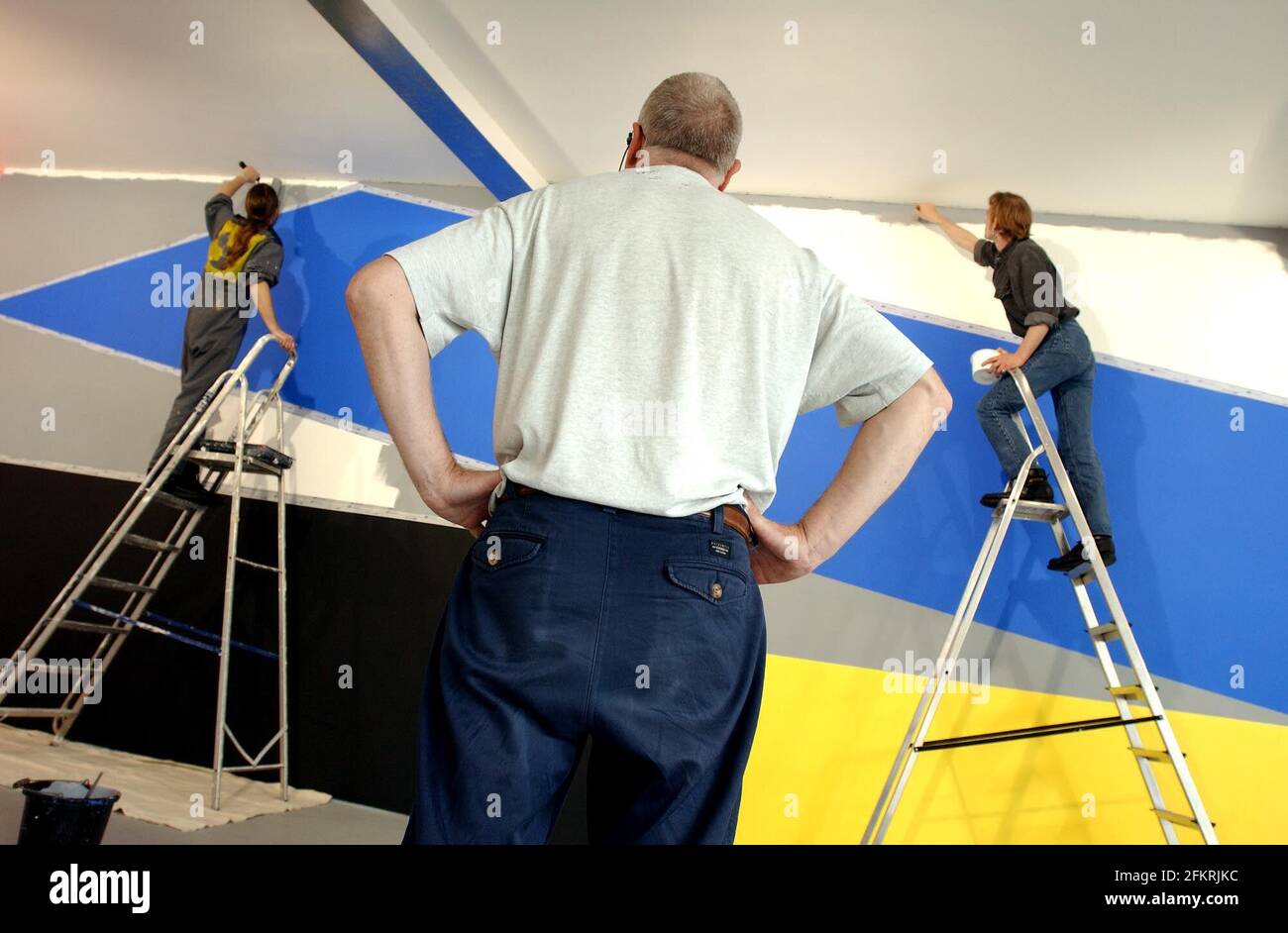 Artist Paul Huxley (centre) with his two sons at the Rhodes + Mann ...