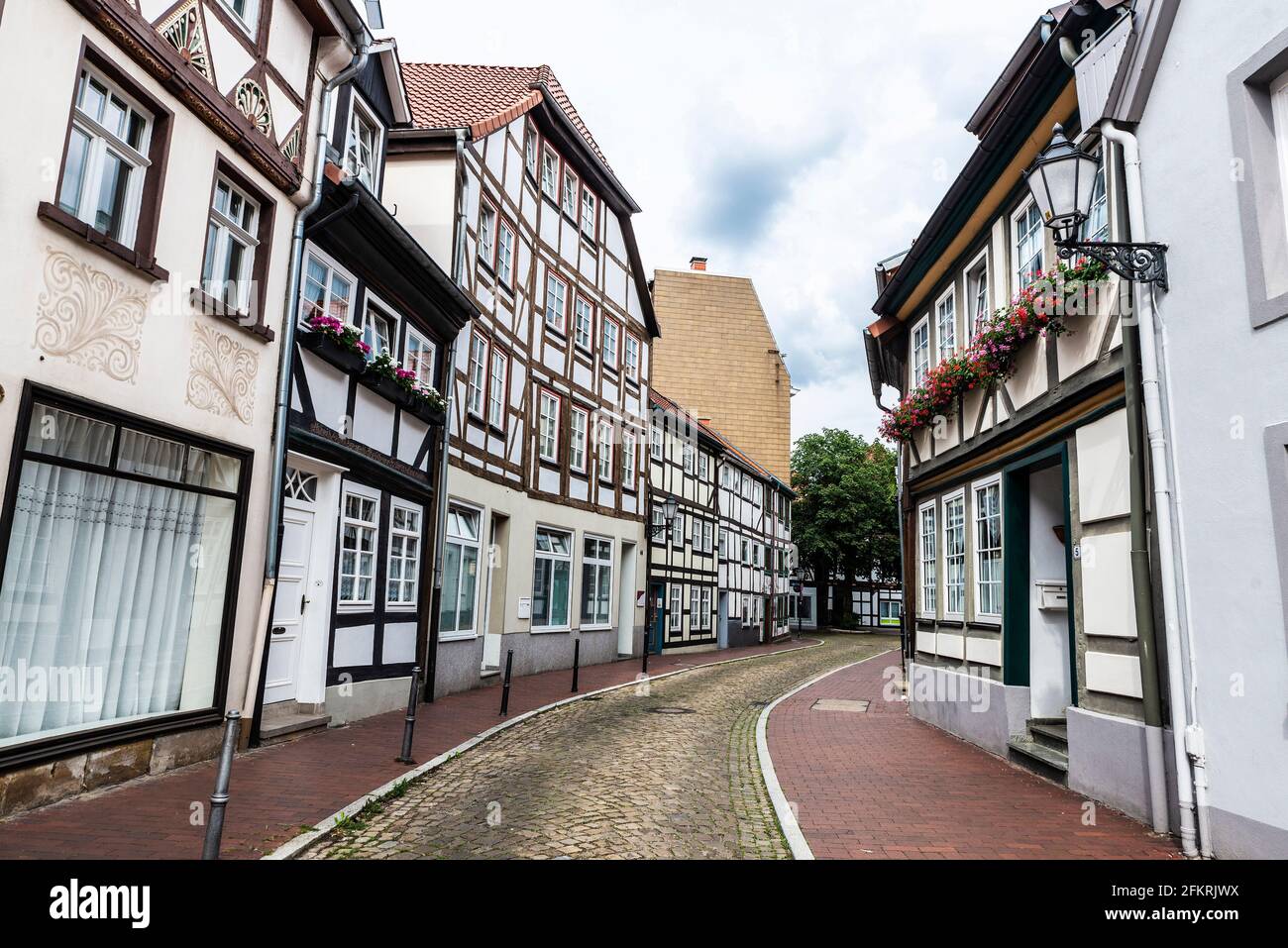 Street with medieval houses in the old town of Hamelin, Lower Saxony ...